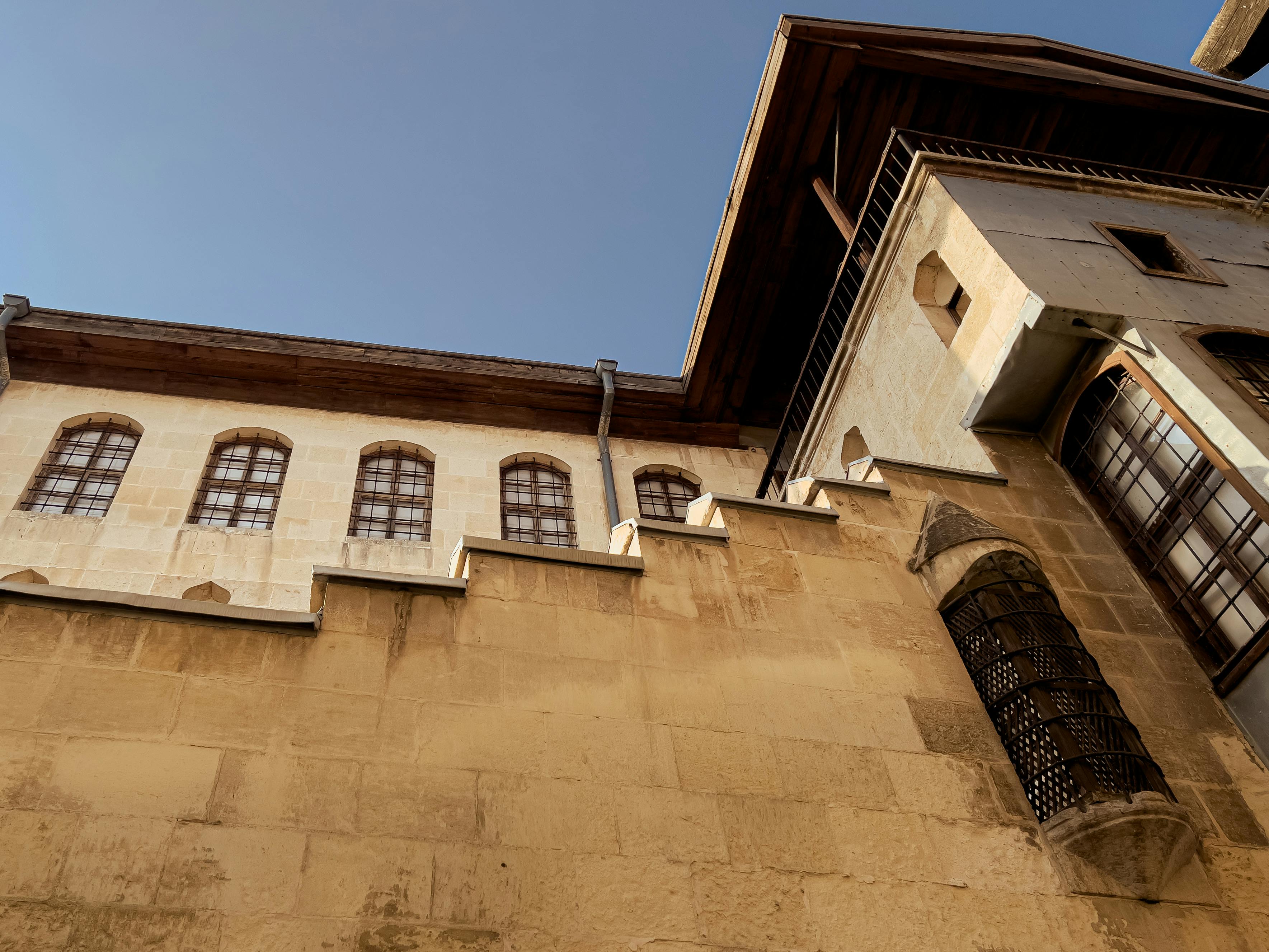 Air Conditioner on Building Wall with Columns · Free Stock Photo