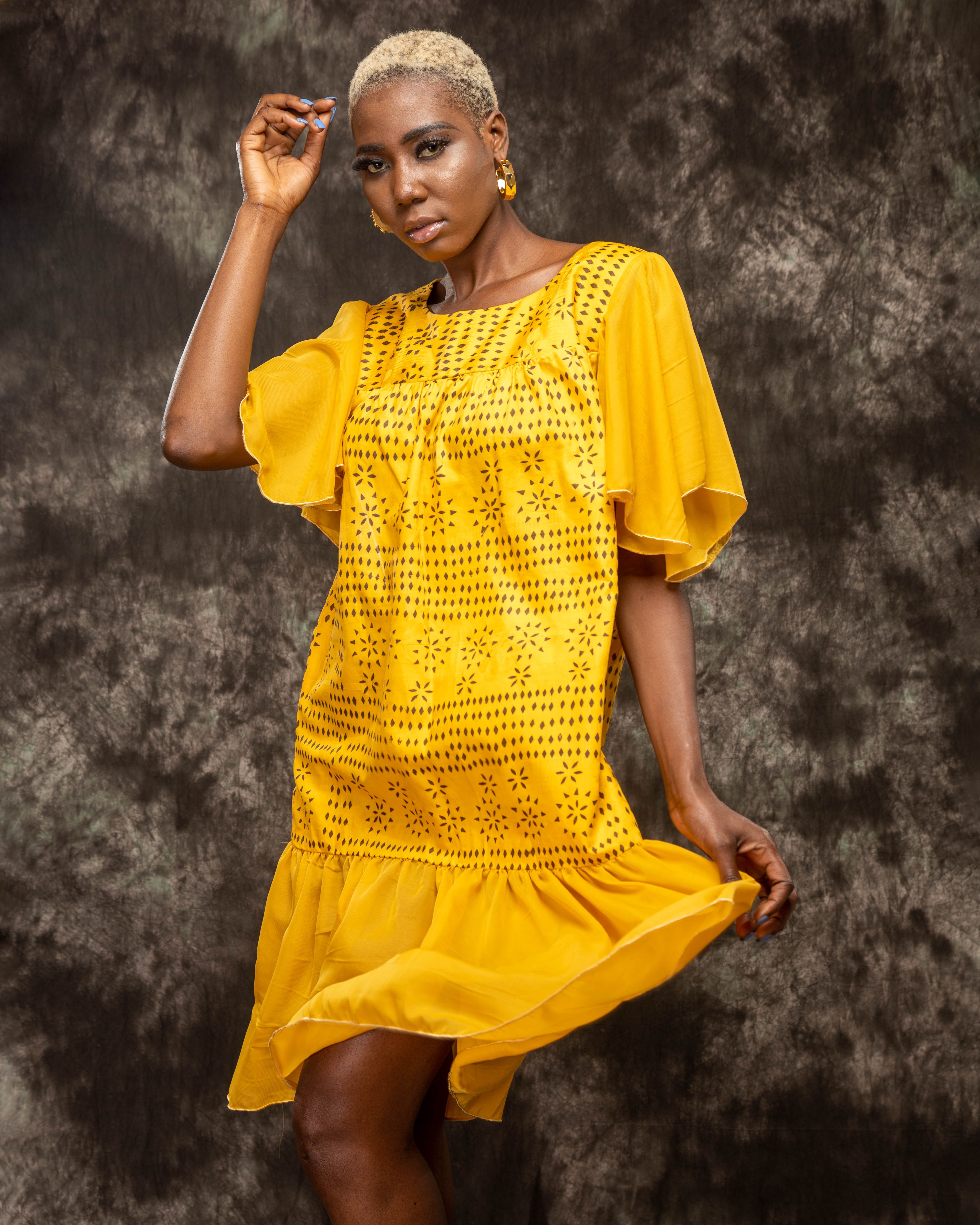 Woman Wearing Yellow Top Holding Hair · Free Stock Photo