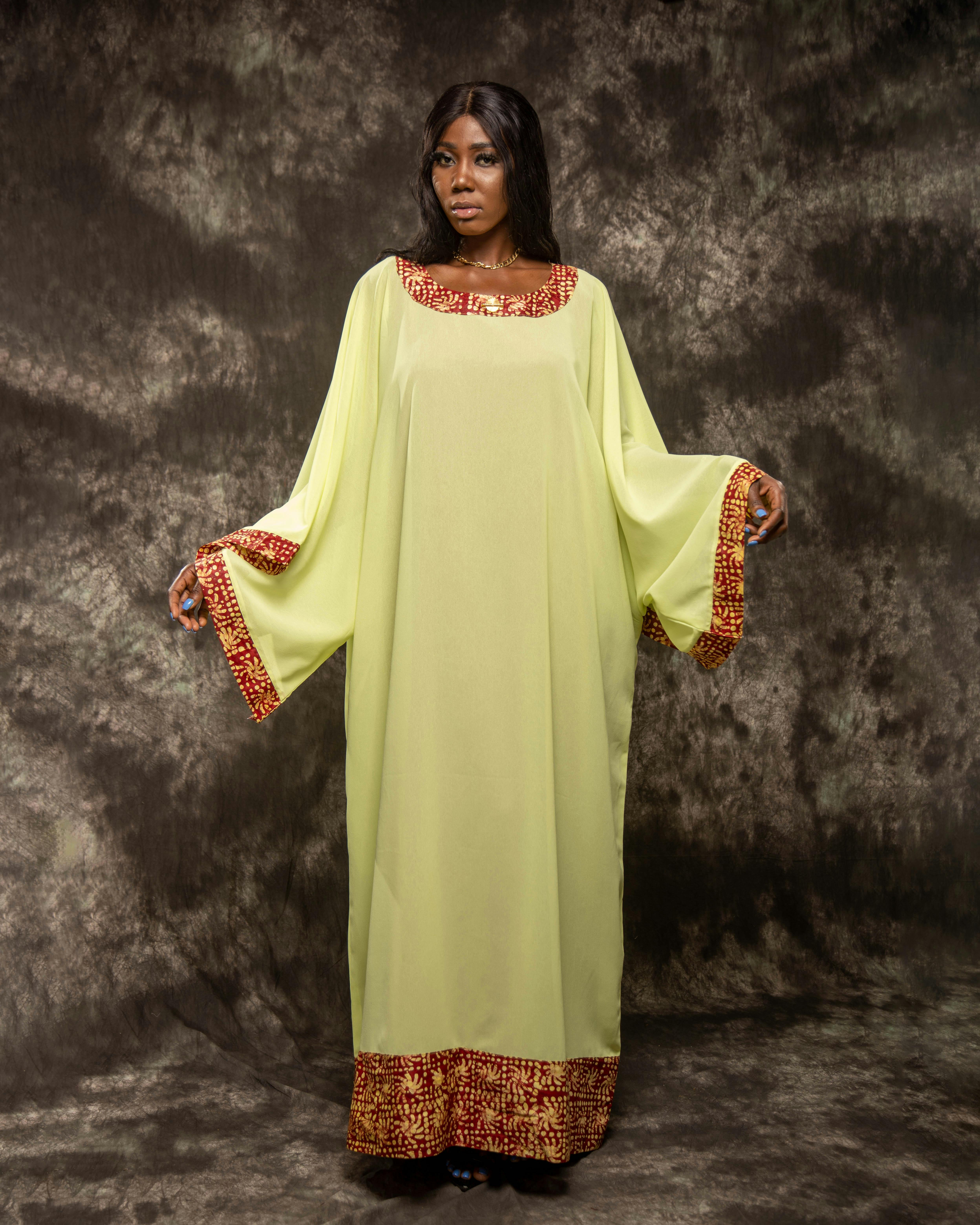 Woman Posing in Traditional Clothing · Free Stock Photo