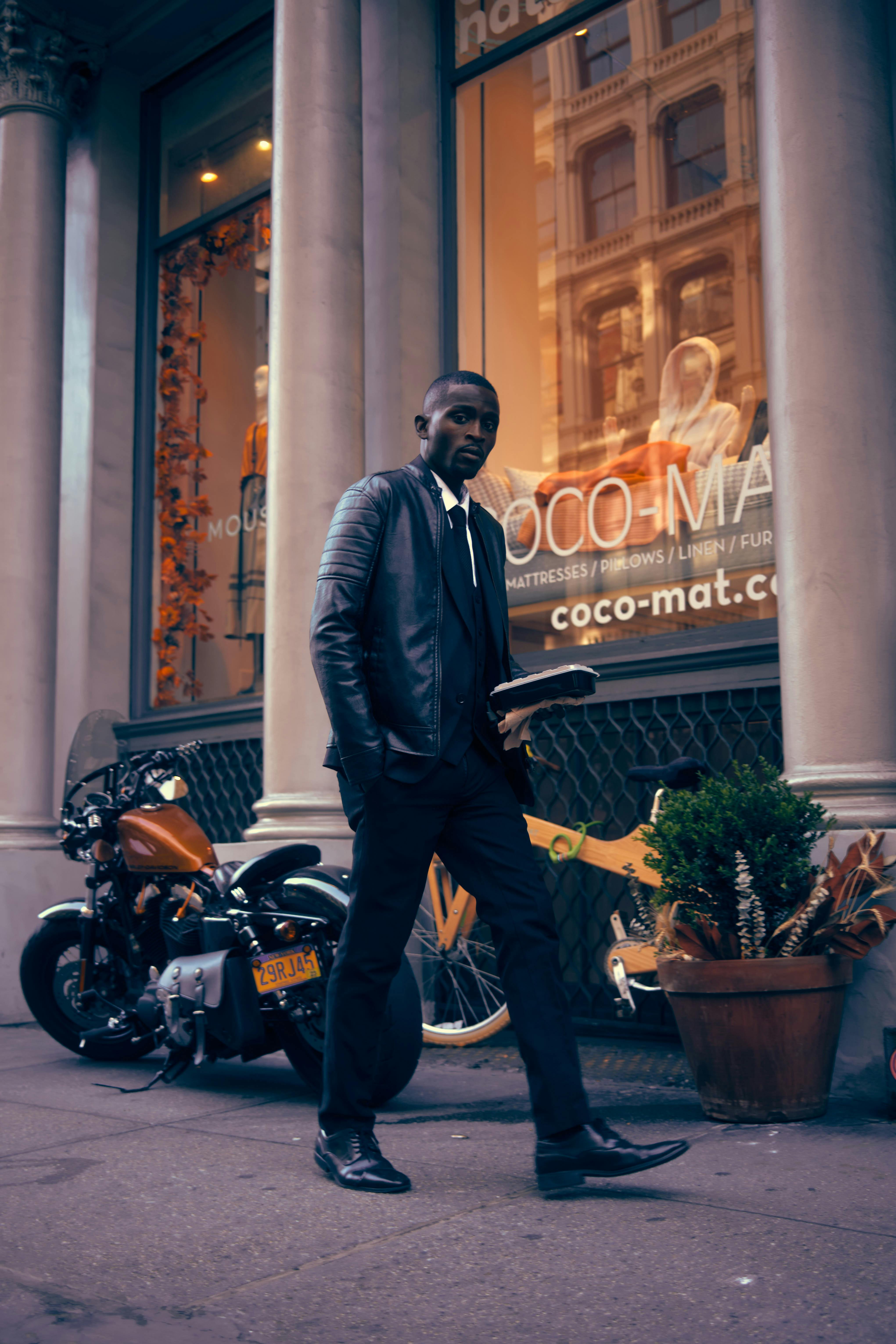 Person Wearing Black Jacket And Bracelets · Free Stock Photo