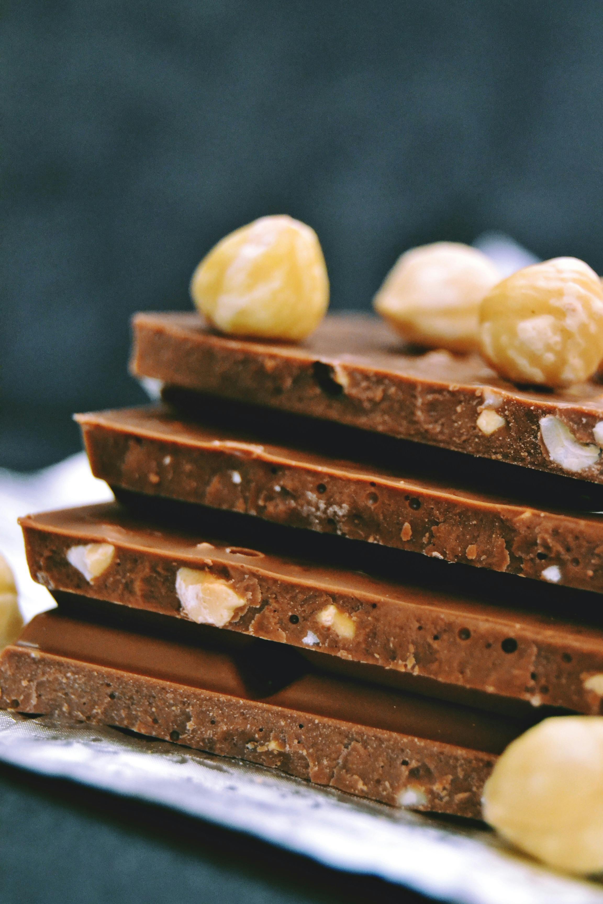 Photograph of Hazelnuts on Top of Chocolate · Free Stock Photo