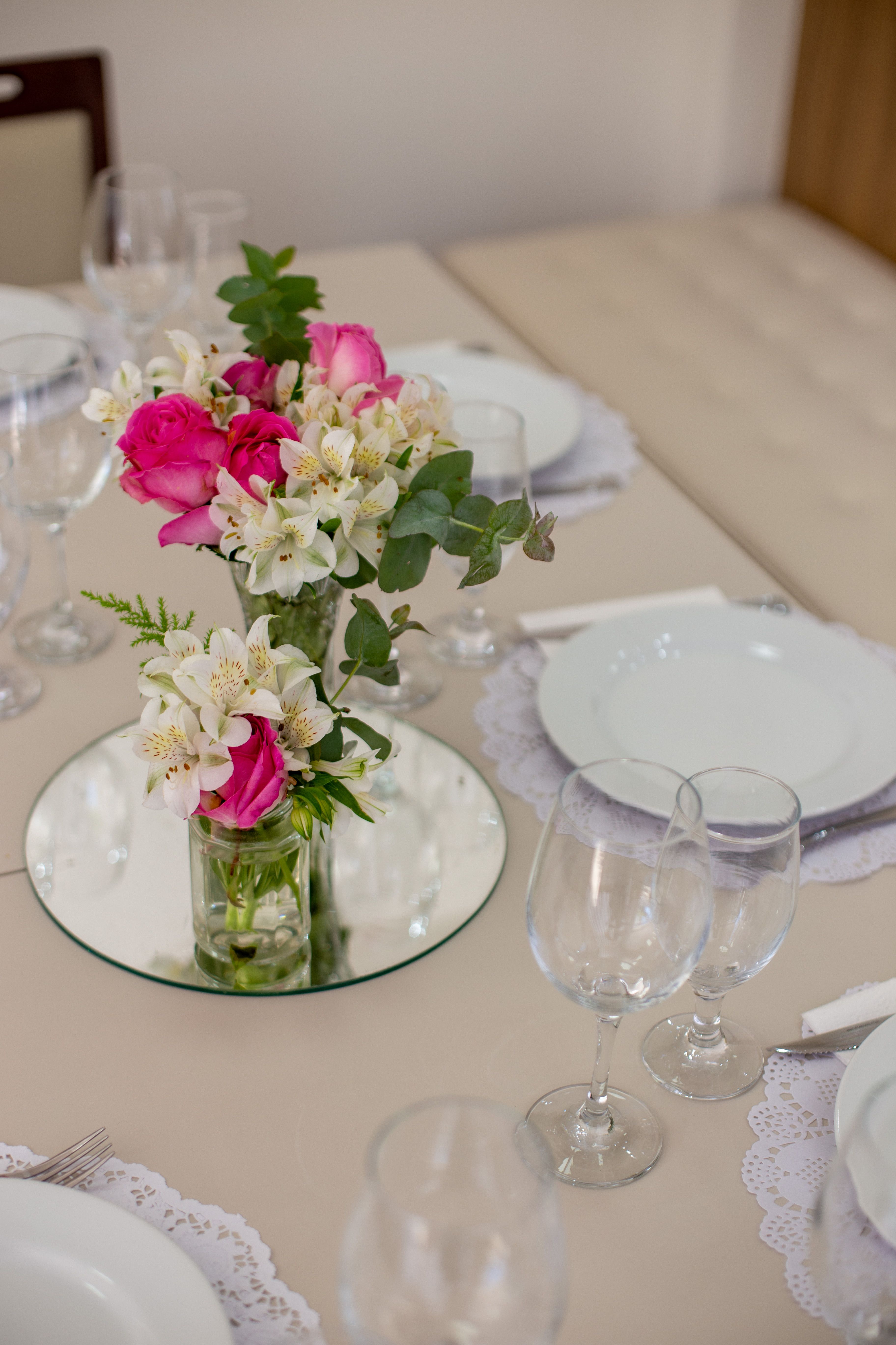 A Dining Table with Flowers in the Vase · Free Stock Photo