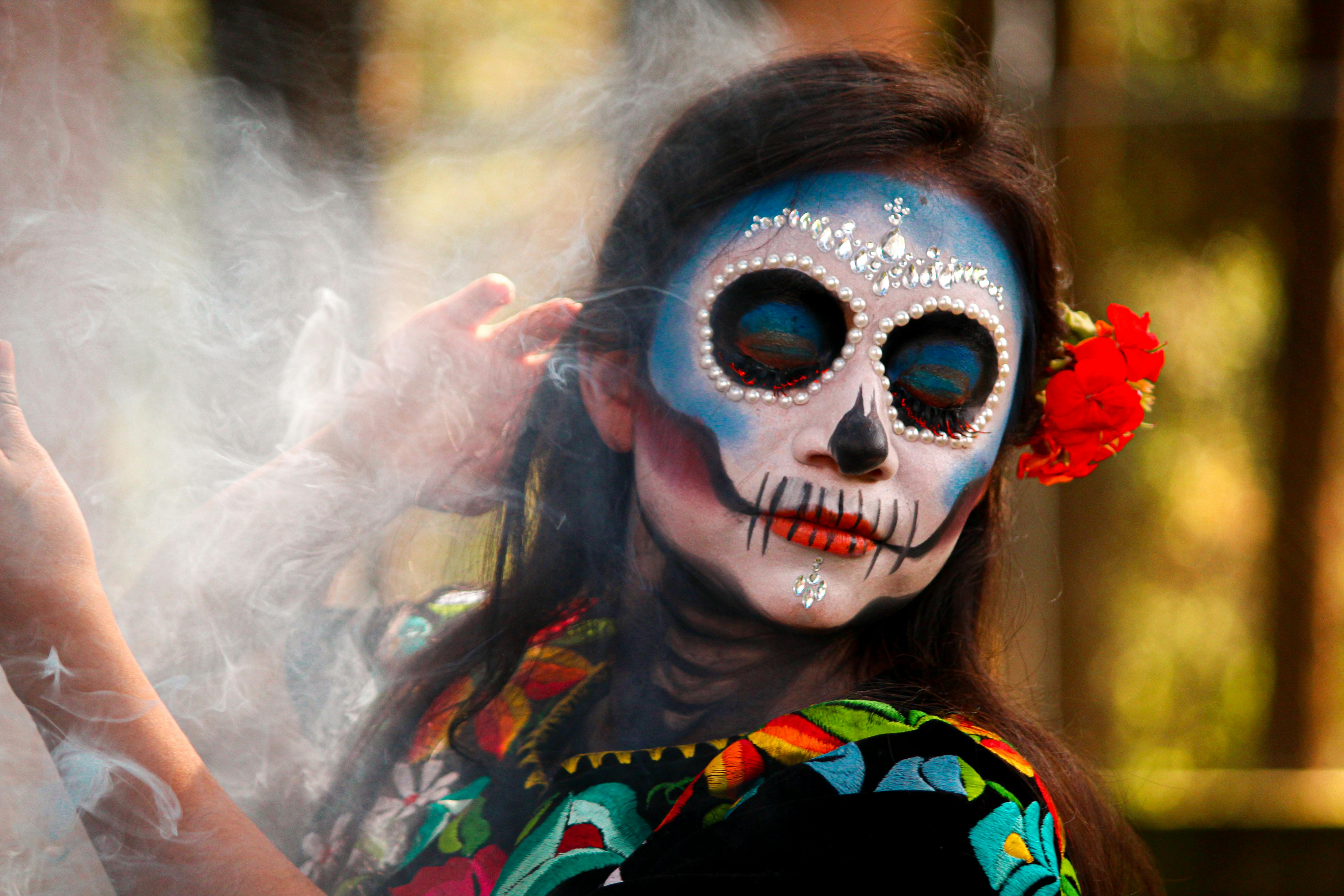 Woman With Purple Face Paint · Free Stock Photo