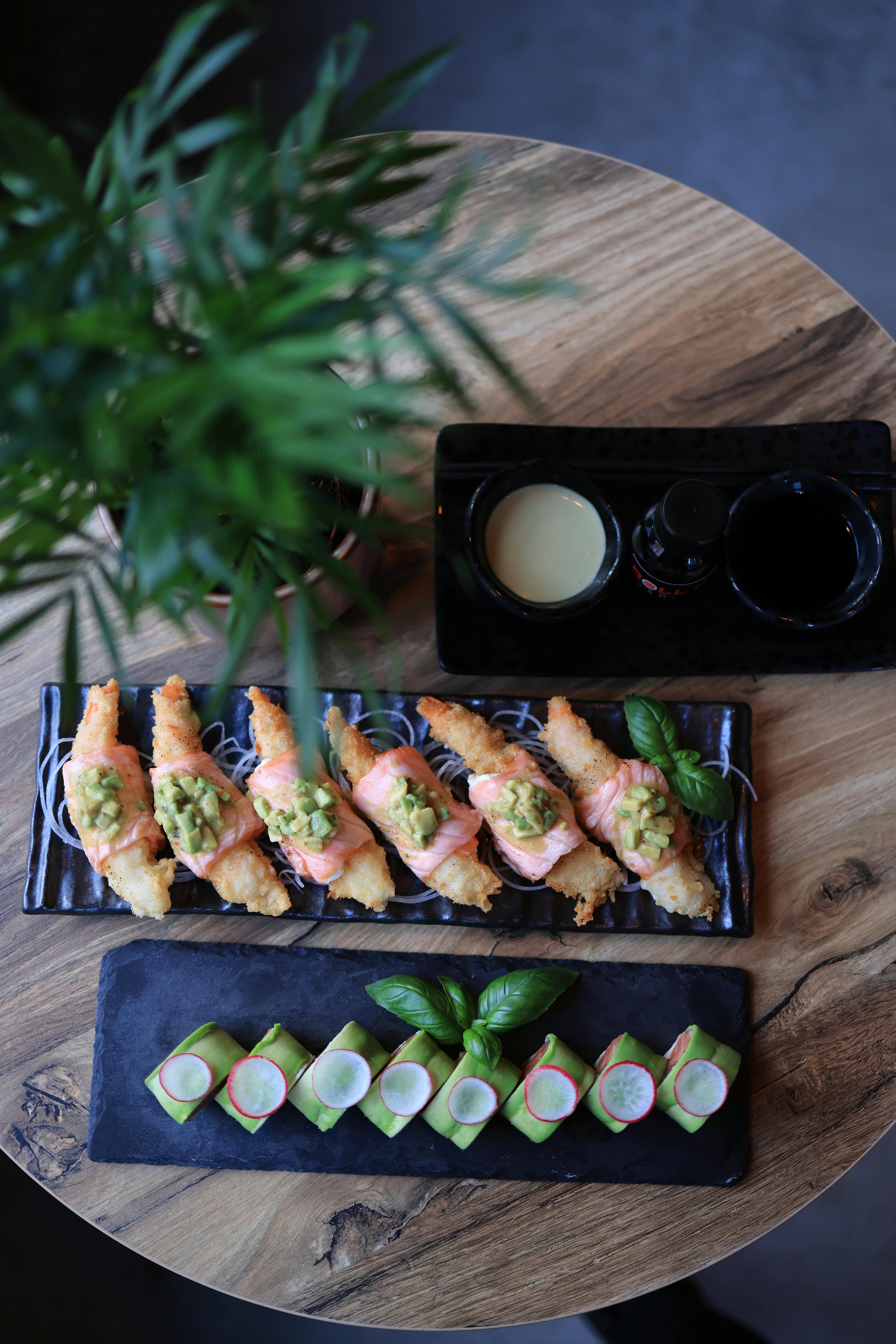 Sushi Snacks on Wooden Table · Free Stock Photo