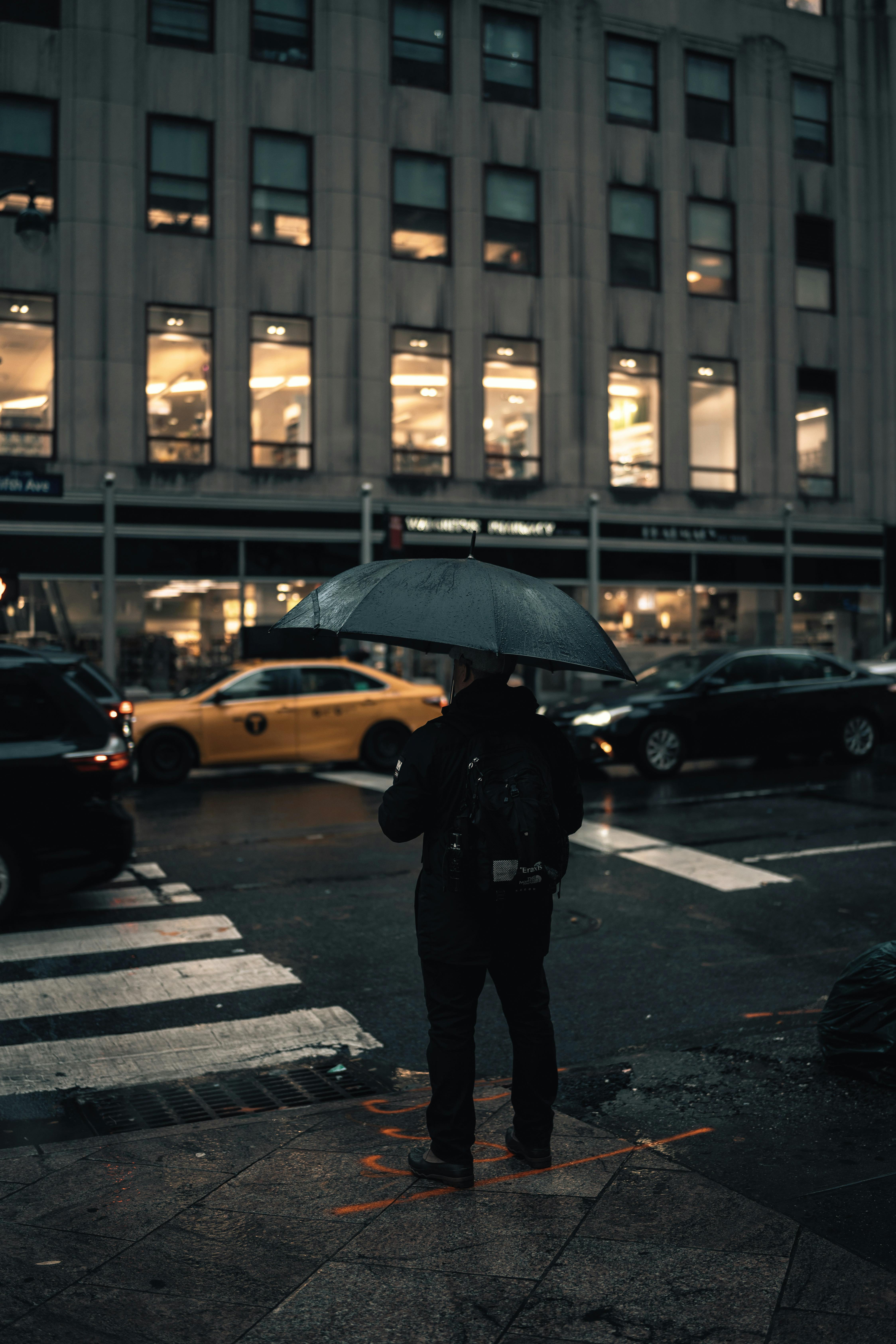 People Walking in Heavy Rain in City · Free Stock Photo