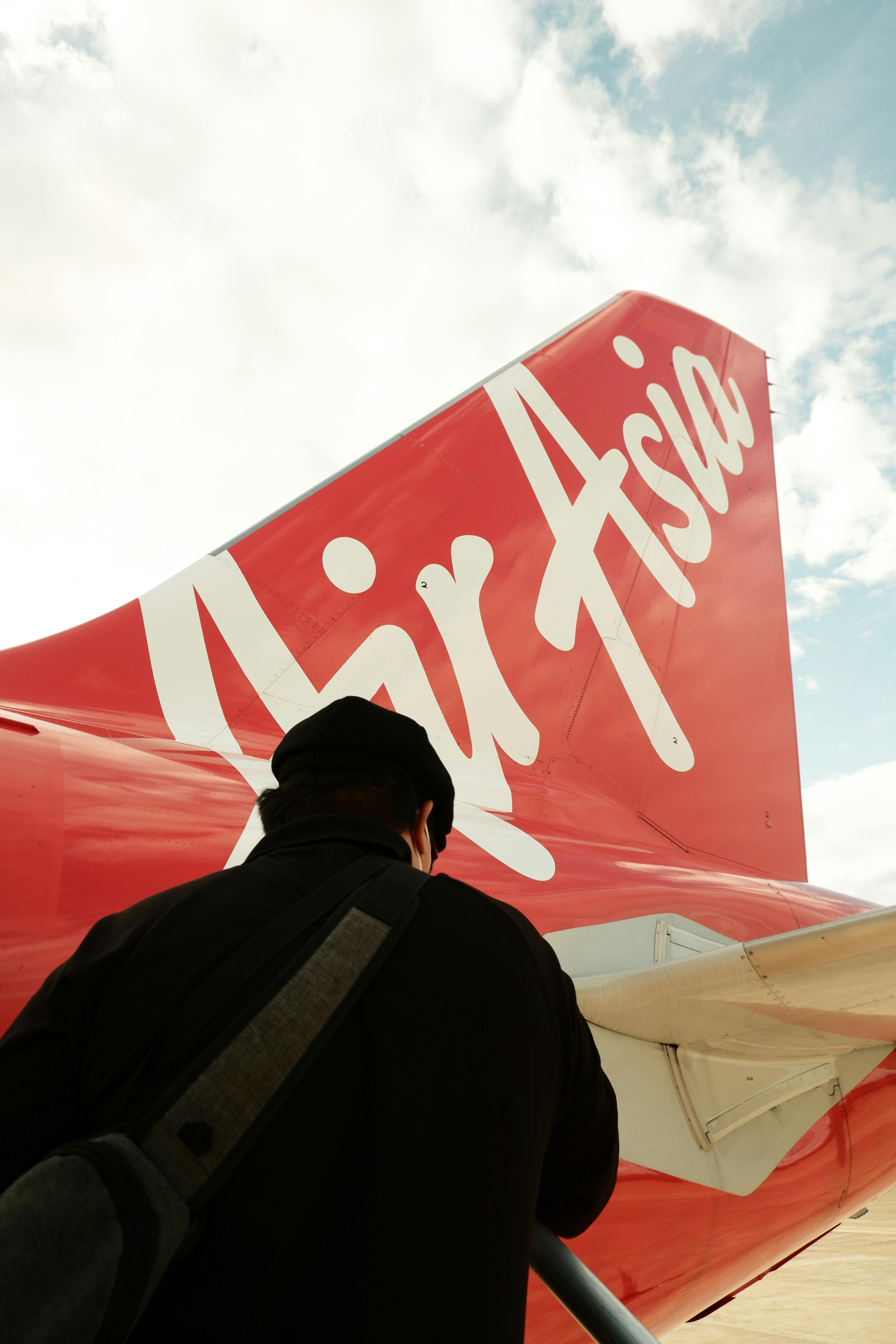 Man Standing neat Airplane Wing · Free Stock Photo