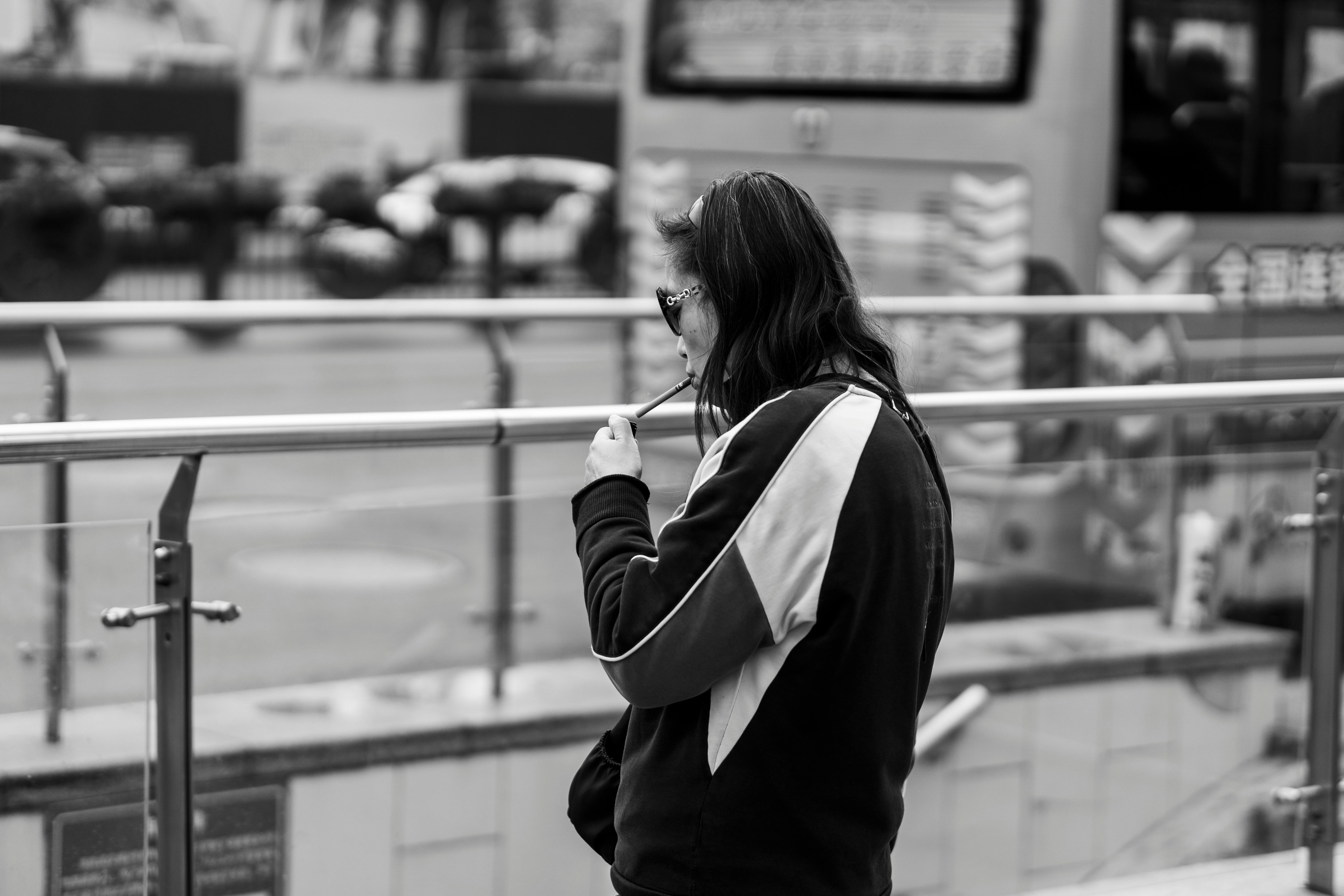 A Grayscale of a Woman Wearing a Suit in Agreement with a Judge · Free ...