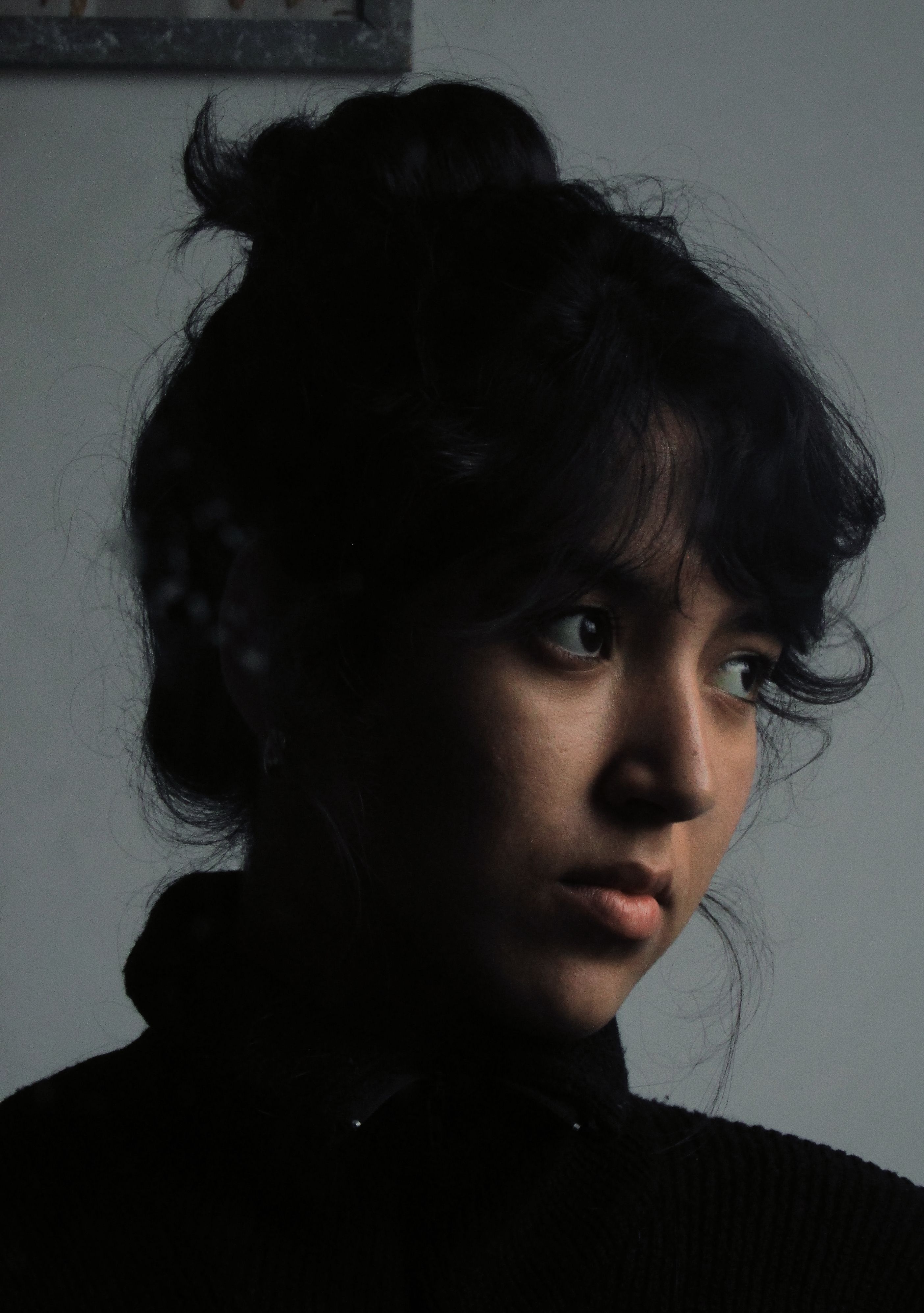 Anonymous woman in dark room · Free Stock Photo