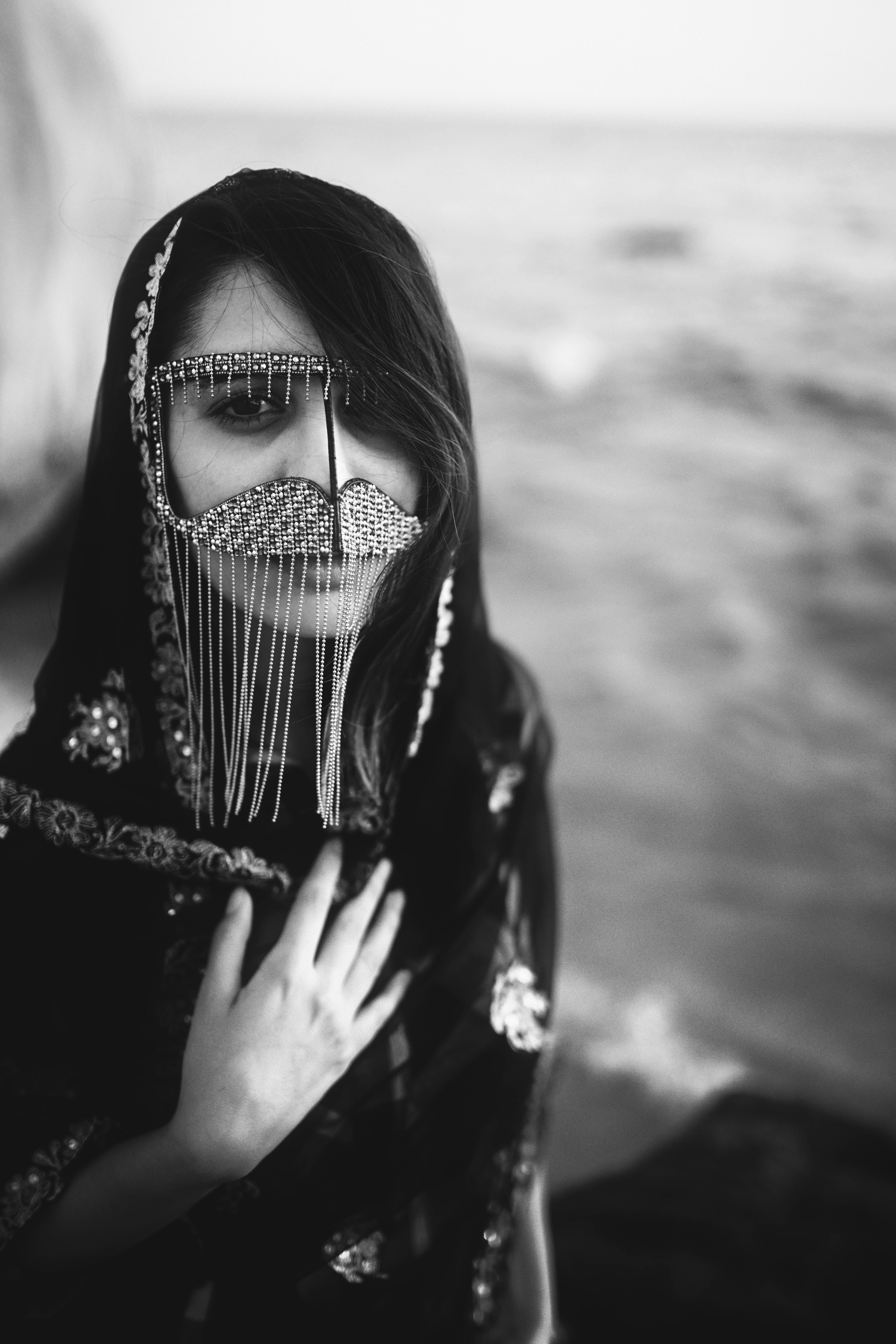 Grayscale Photo of a Woman in Traditional Clothing · Free Stock Photo