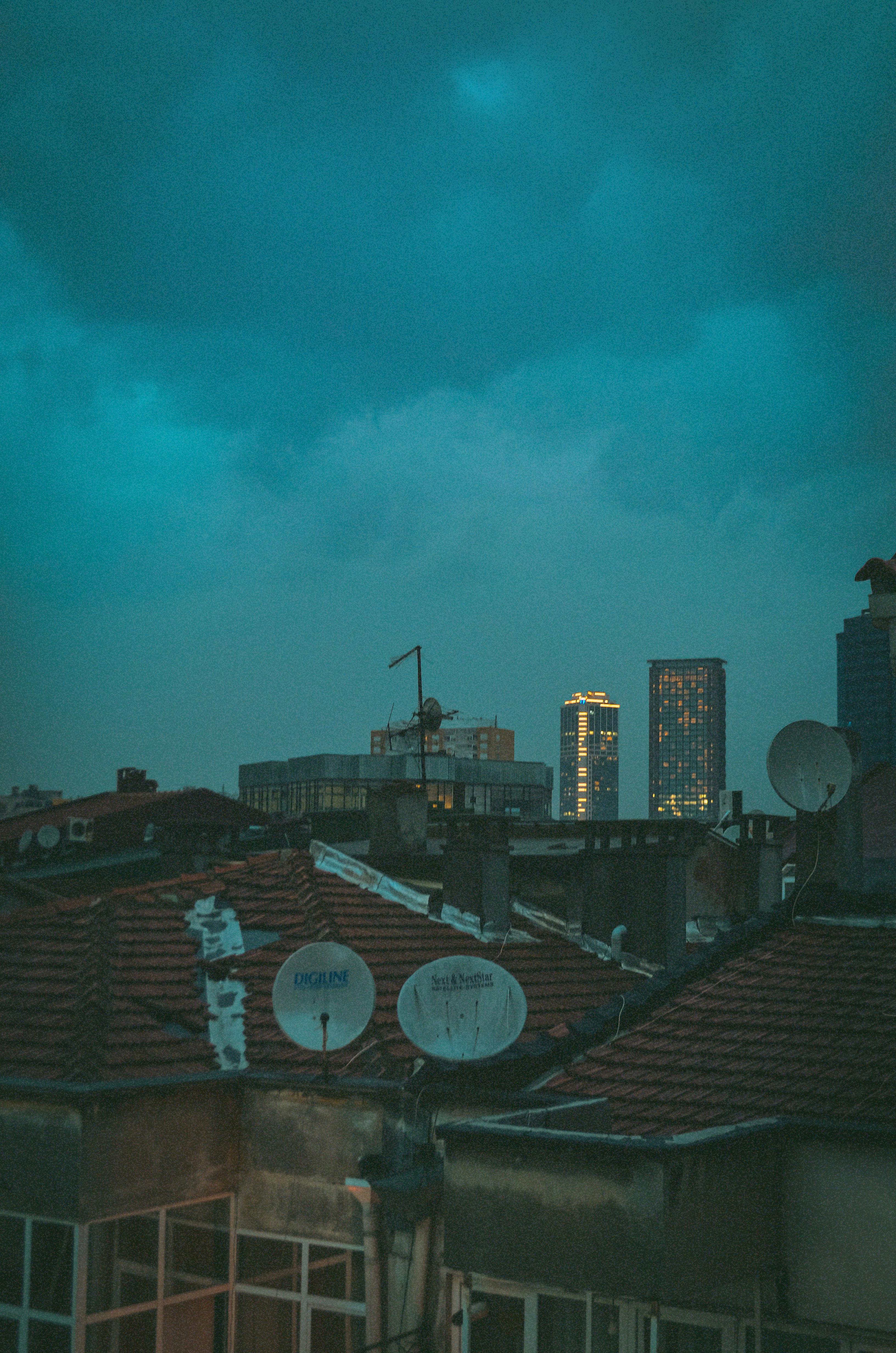 Buildings Rooftops and Skyscrapers in Background · Free Stock Photo