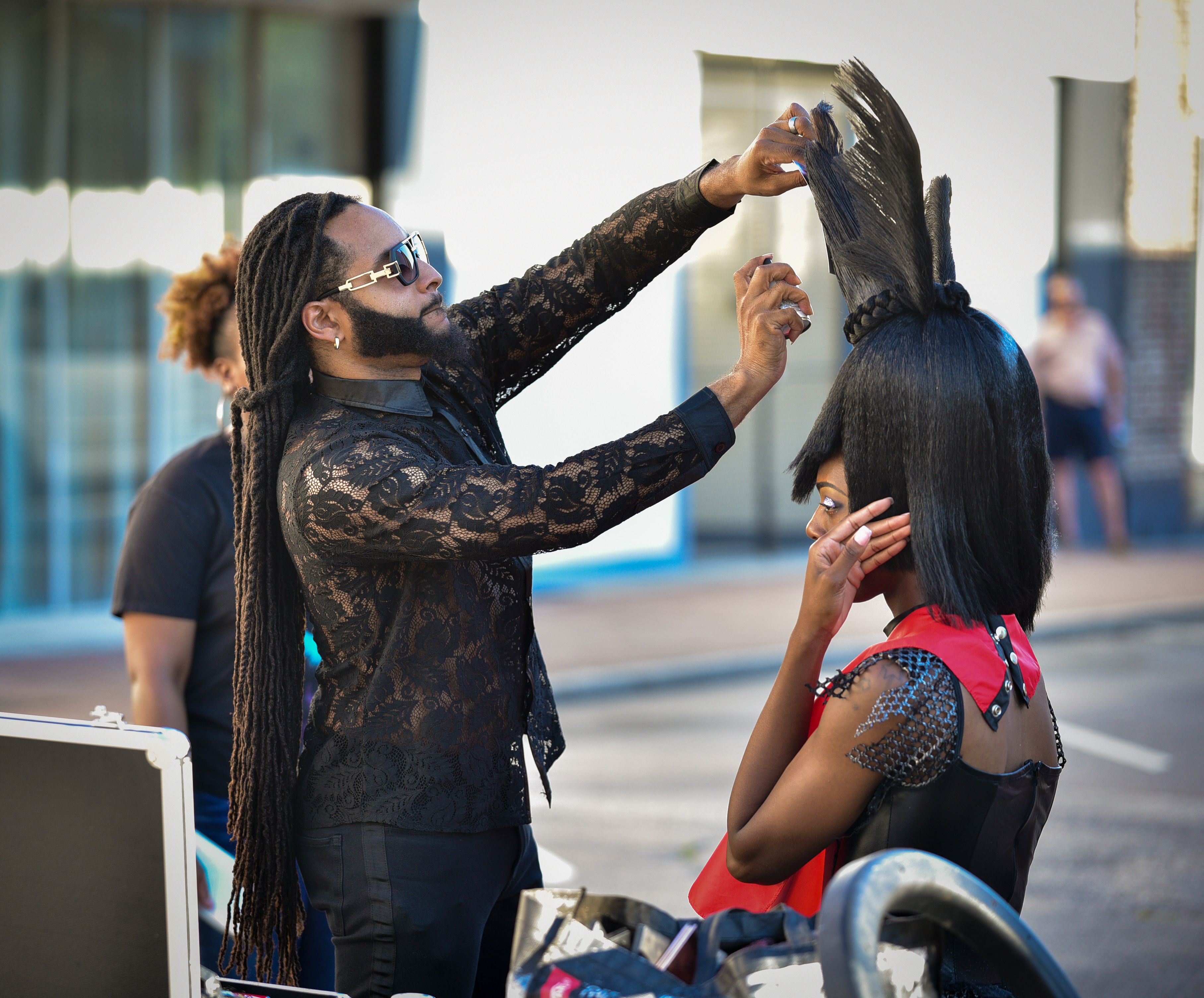 Man Raising Woman Hair · Free Stock Photo