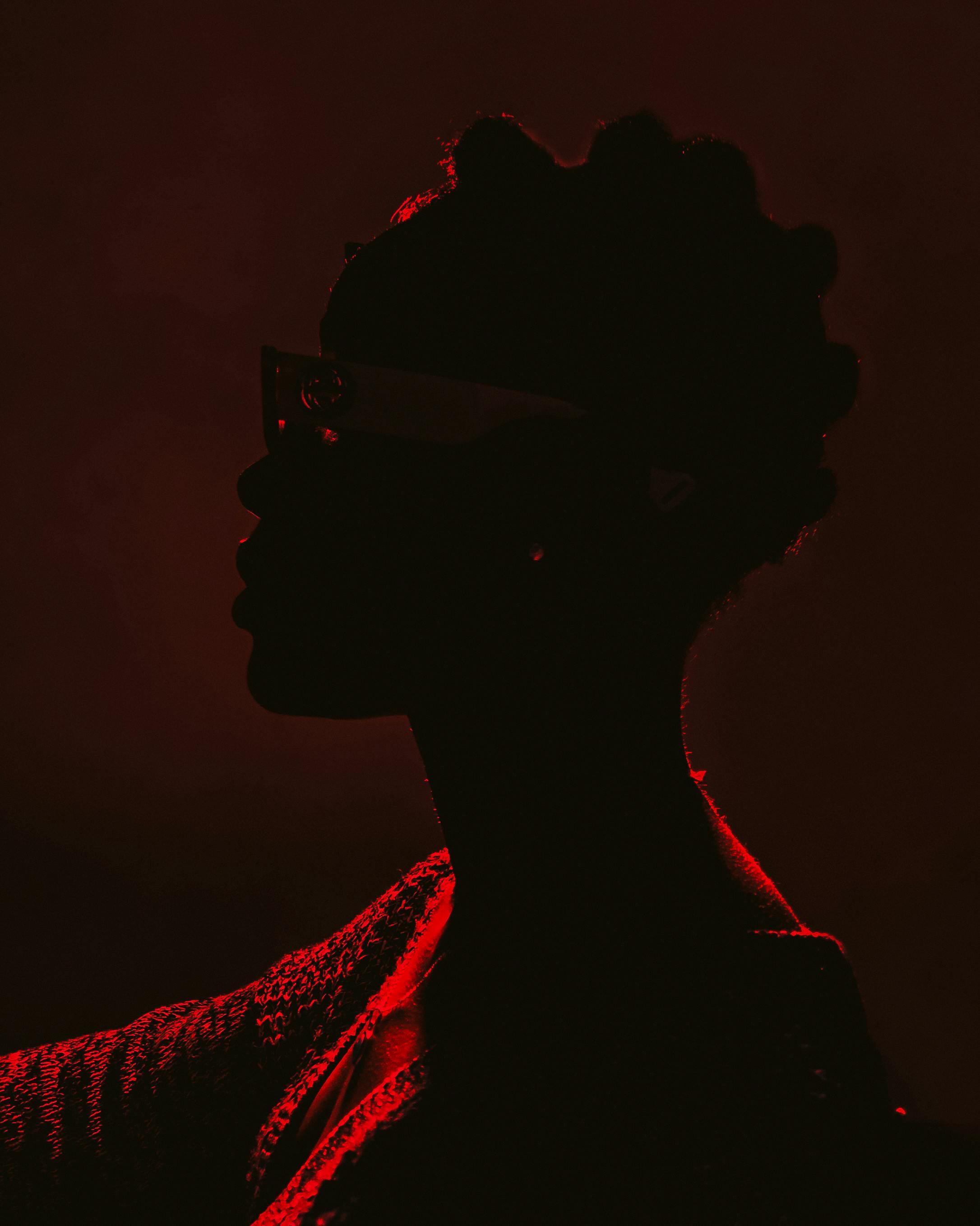 Portrait of Woman Under Red Light · Free Stock Photo