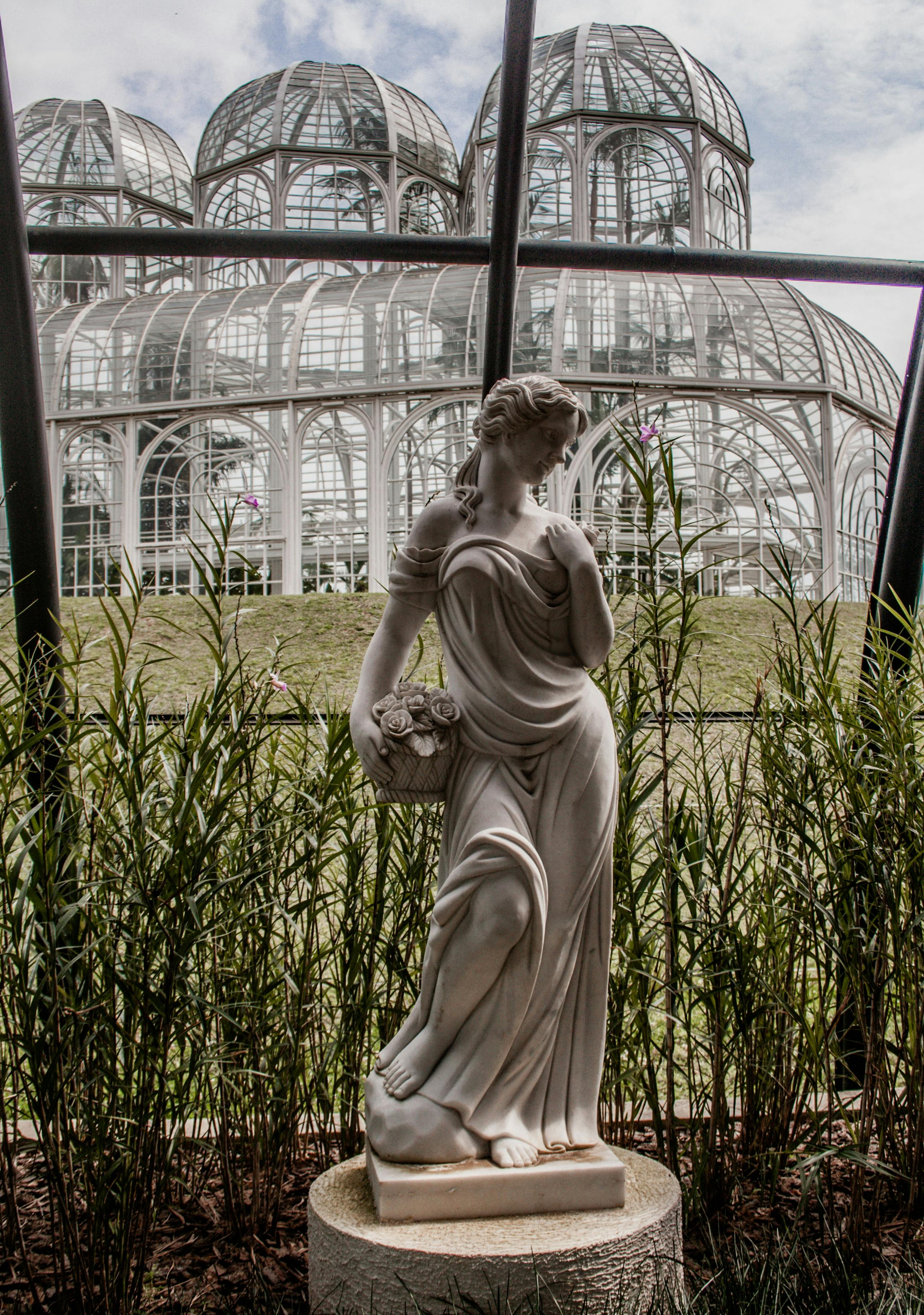 Statue with Colorful Dress and Flowers · Free Stock Photo