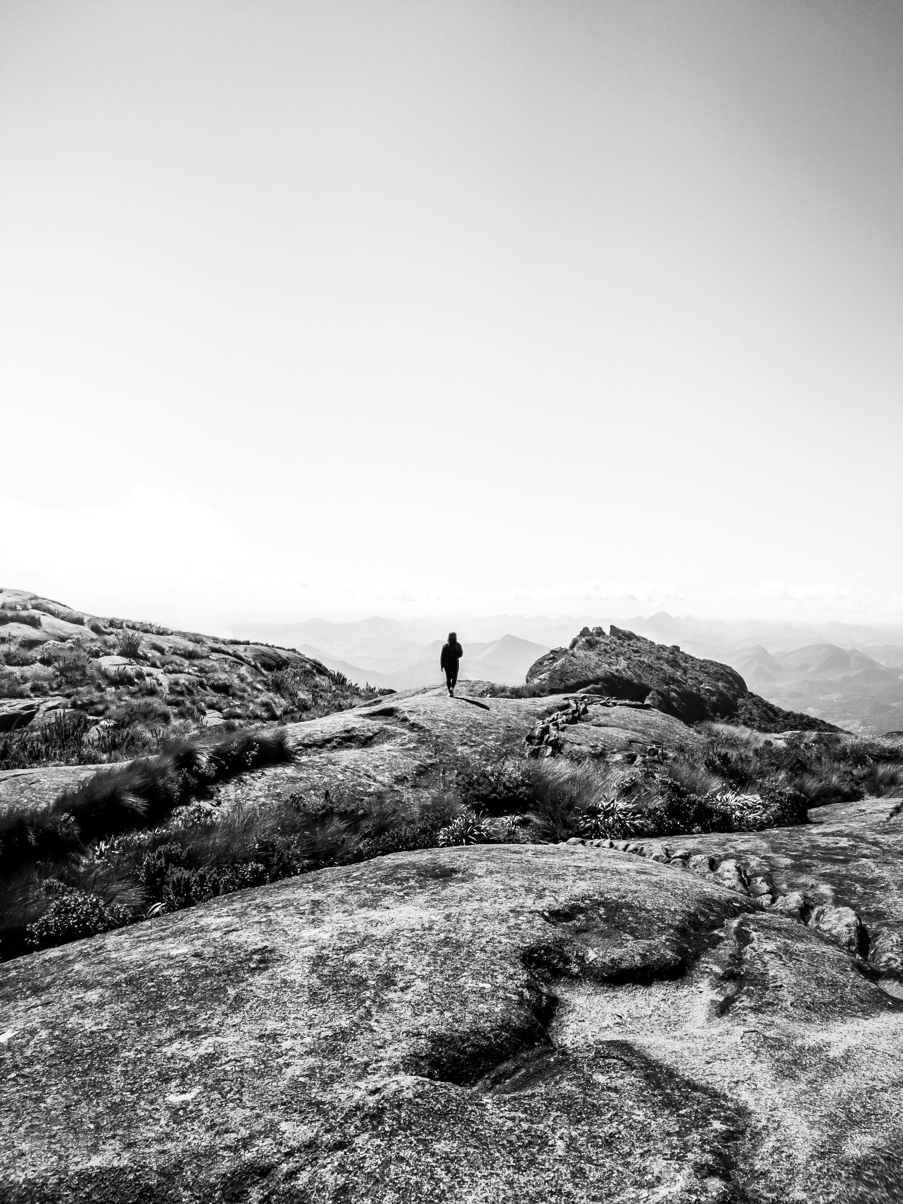 Person Looking Afar Standing on Cliff · Free Stock Photo