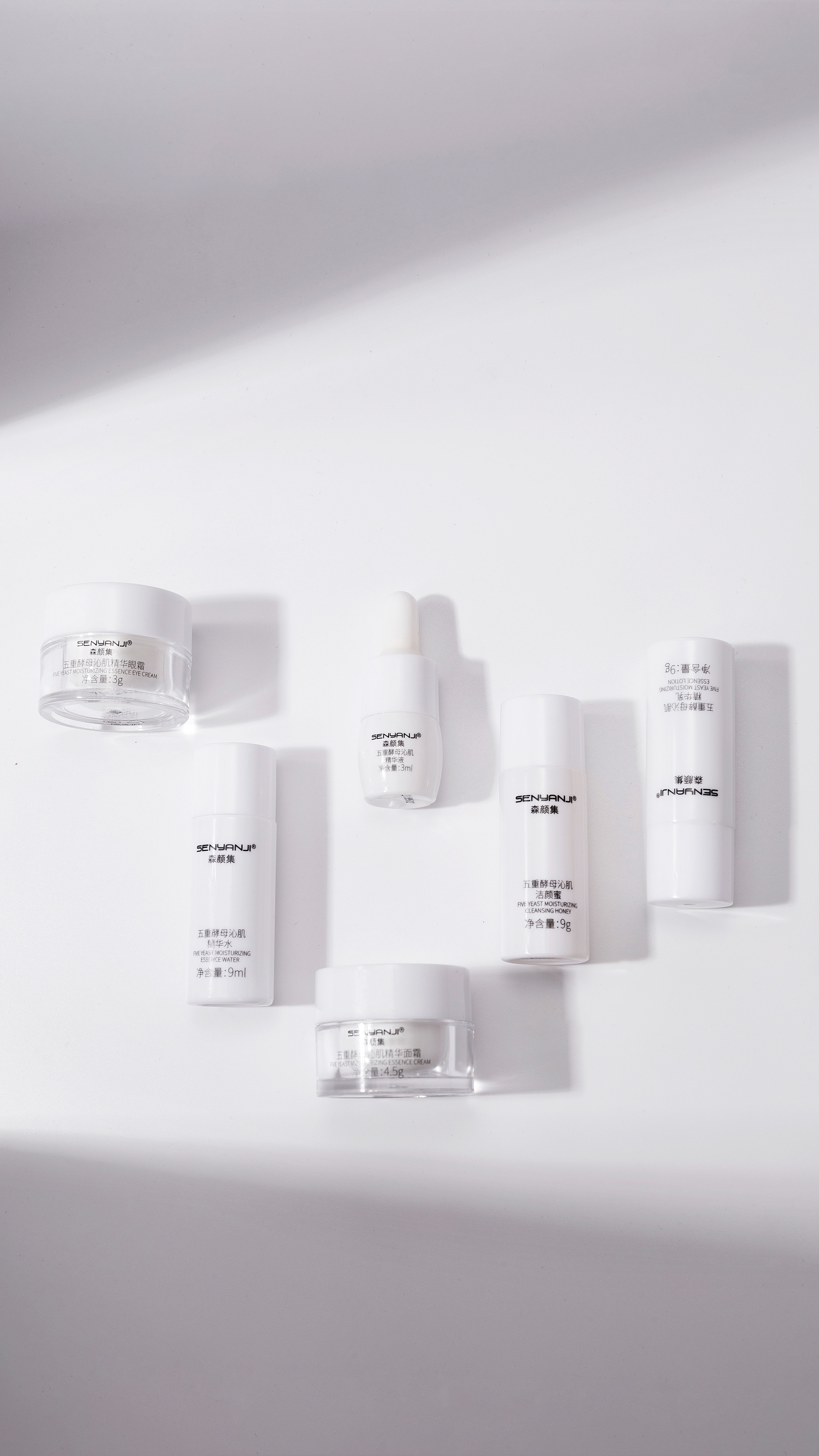 Cosmetic Products on White Background · Free Stock Photo