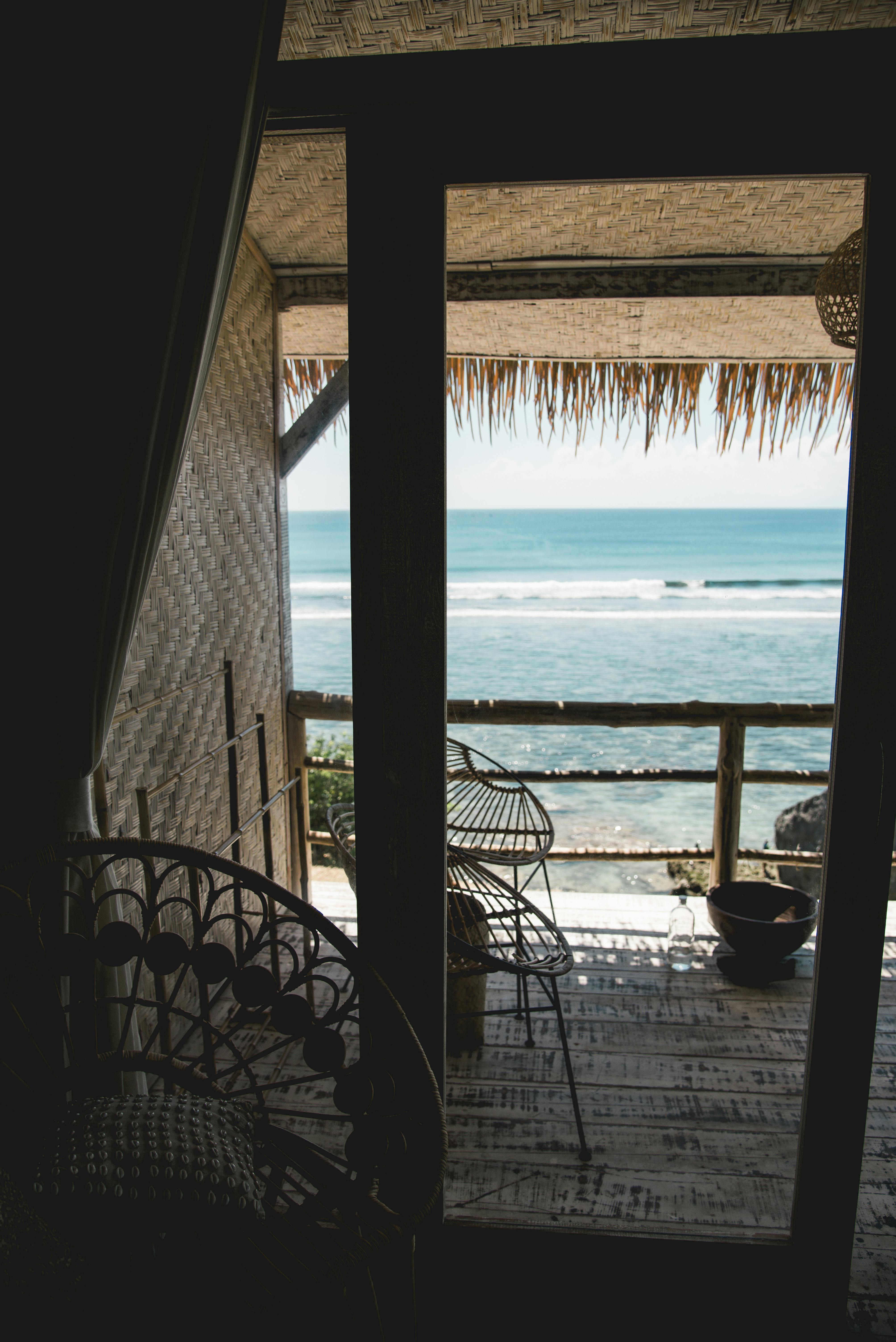 Cottage Balcony Overlooking the Sea · Free Stock Photo
