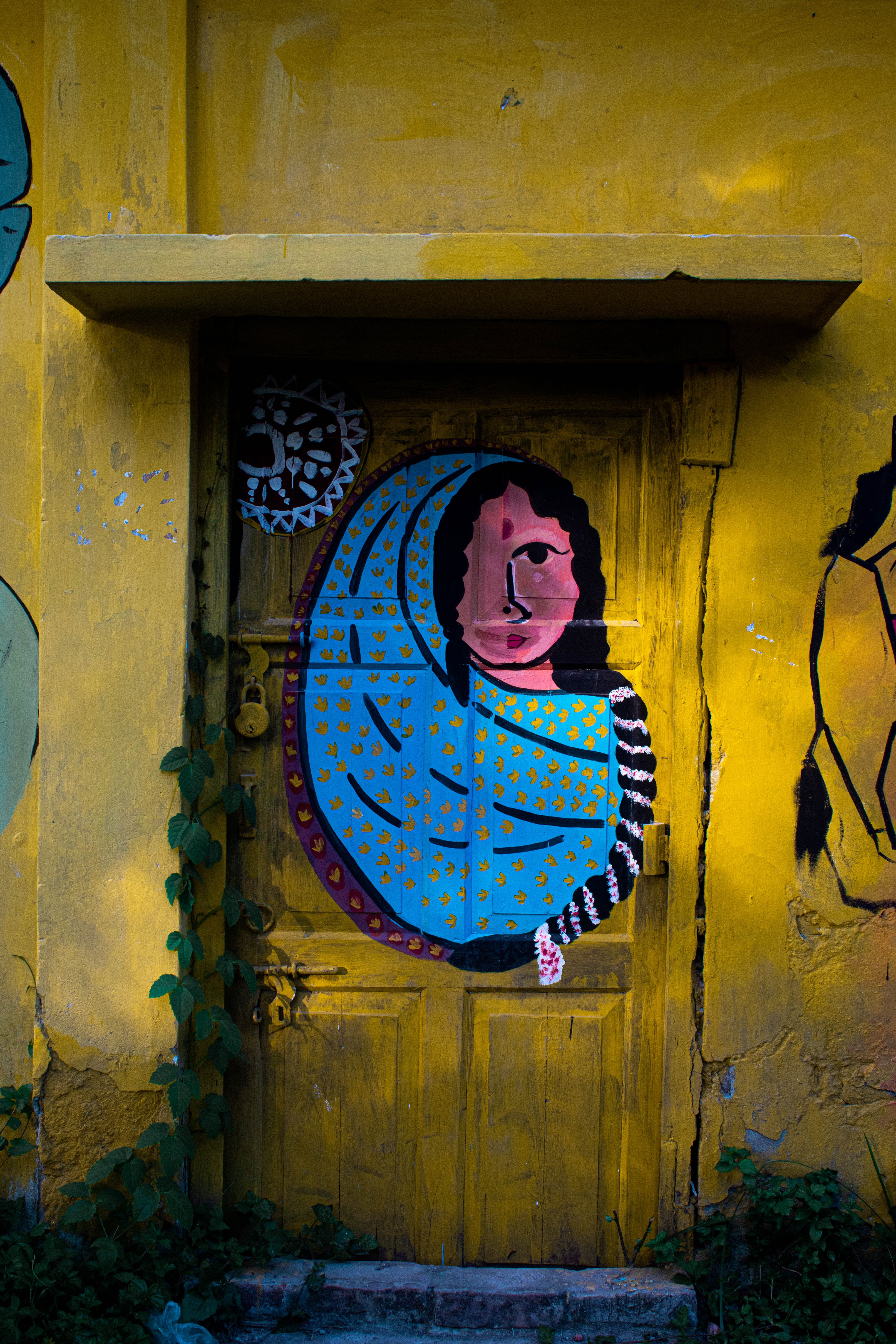 Mural on a Yellow Wall · Free Stock Photo