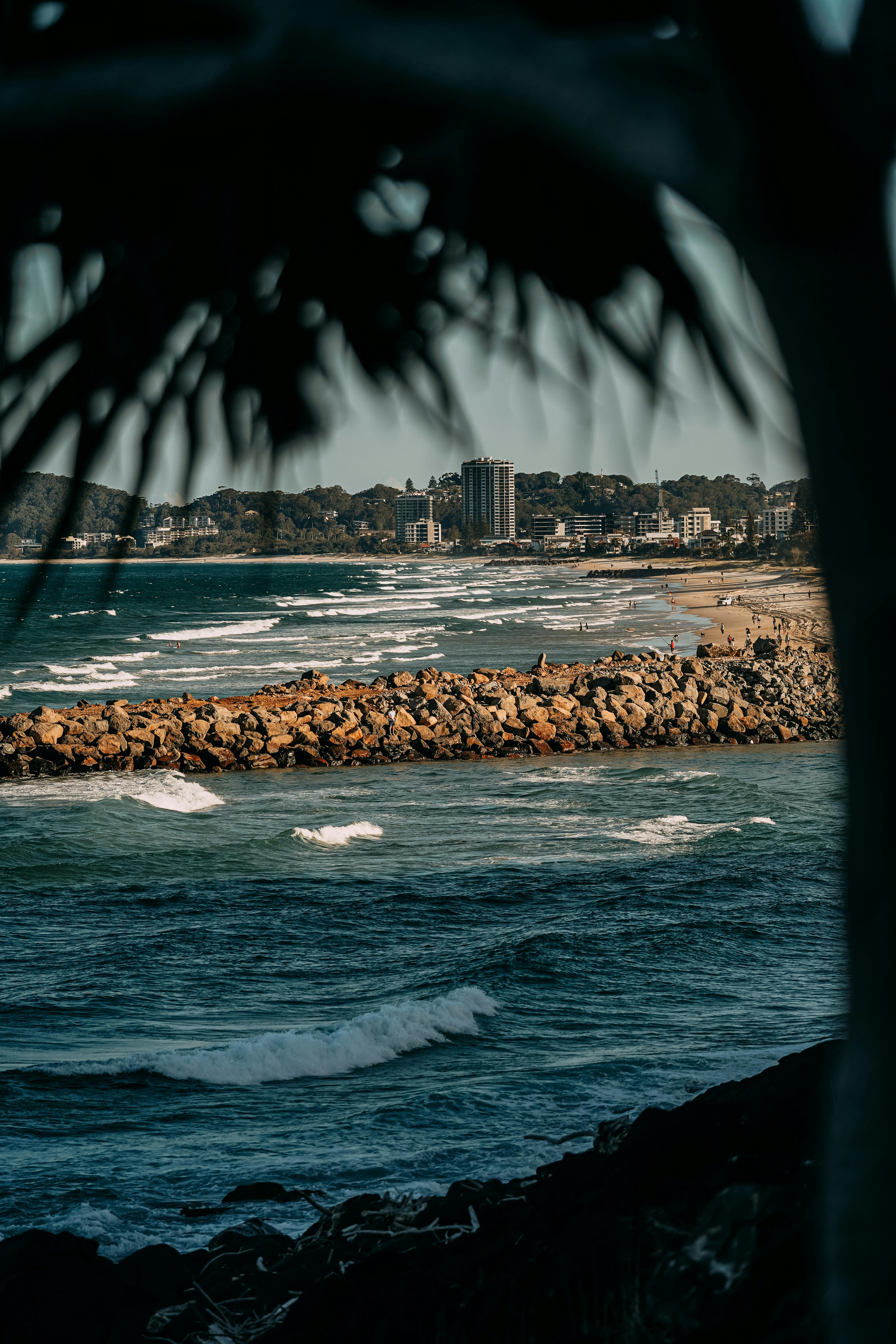 Stone Breakwater at the City Beach · Free Stock Photo