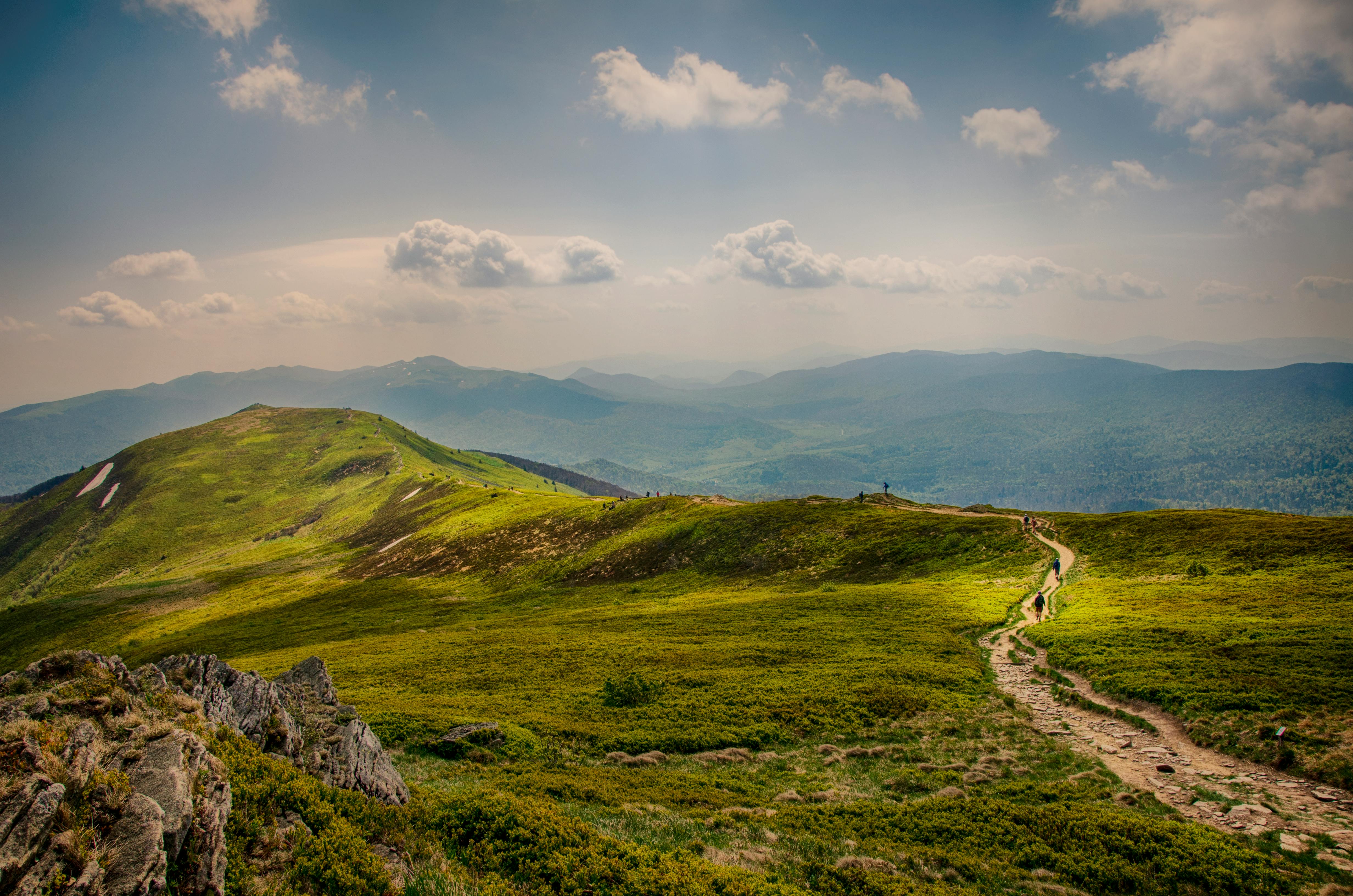 Landscape Photography of Grass-covered Rock Formation · Free Stock Photo