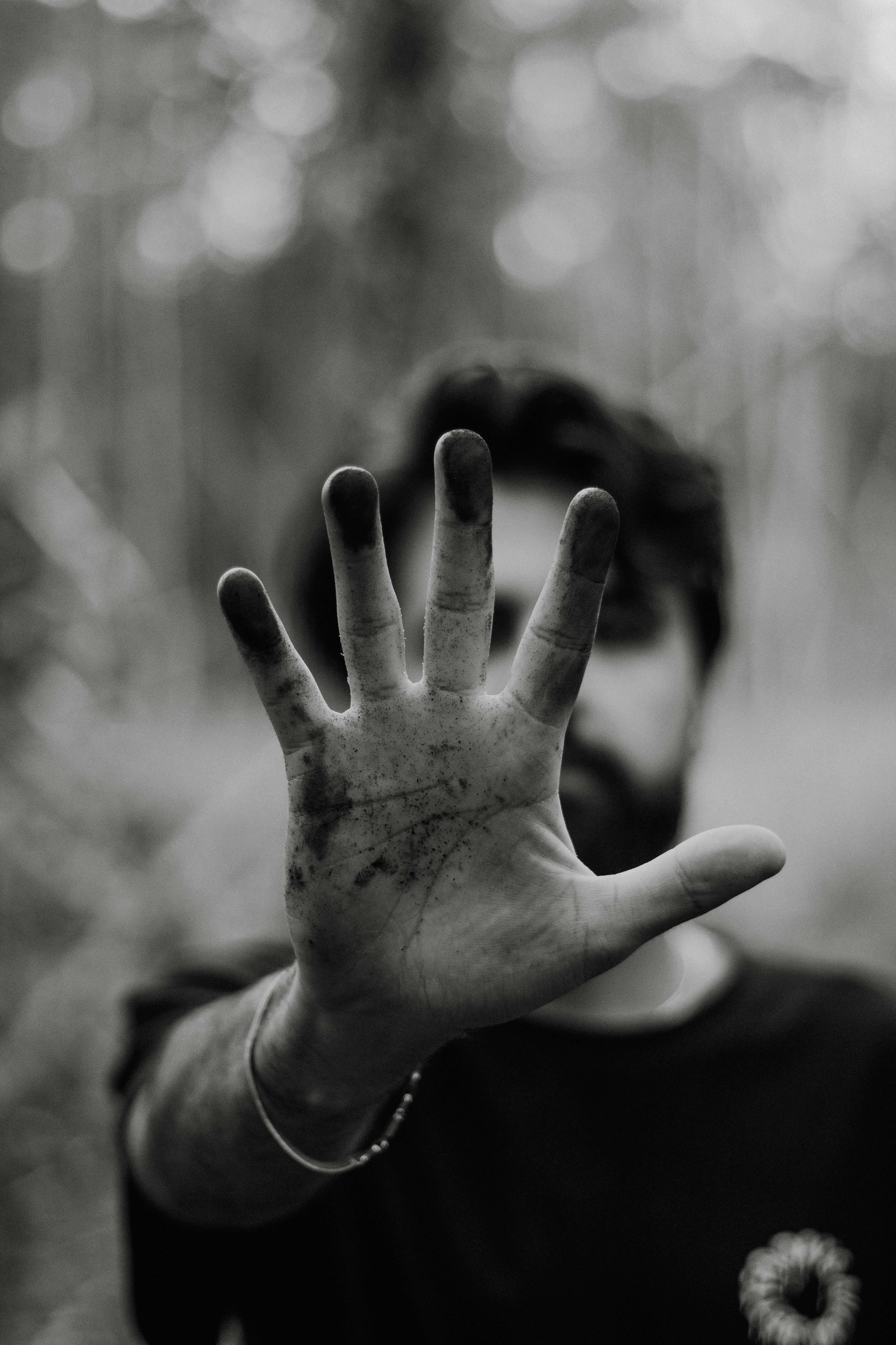 Grayscale Photo of a Dirty Hand · Free Stock Photo