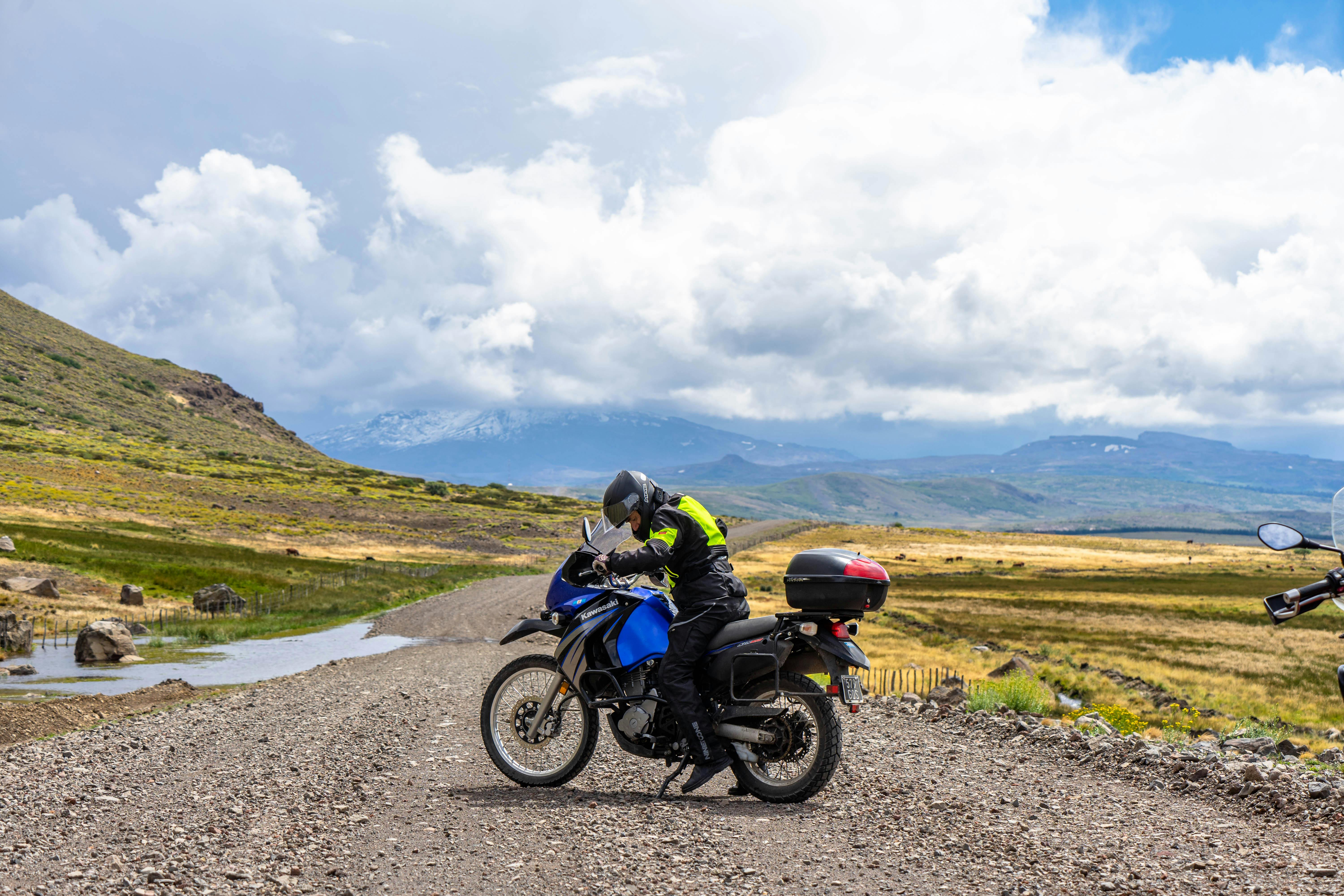 A Man Sitting on the Motorcycle · Free Stock Photo