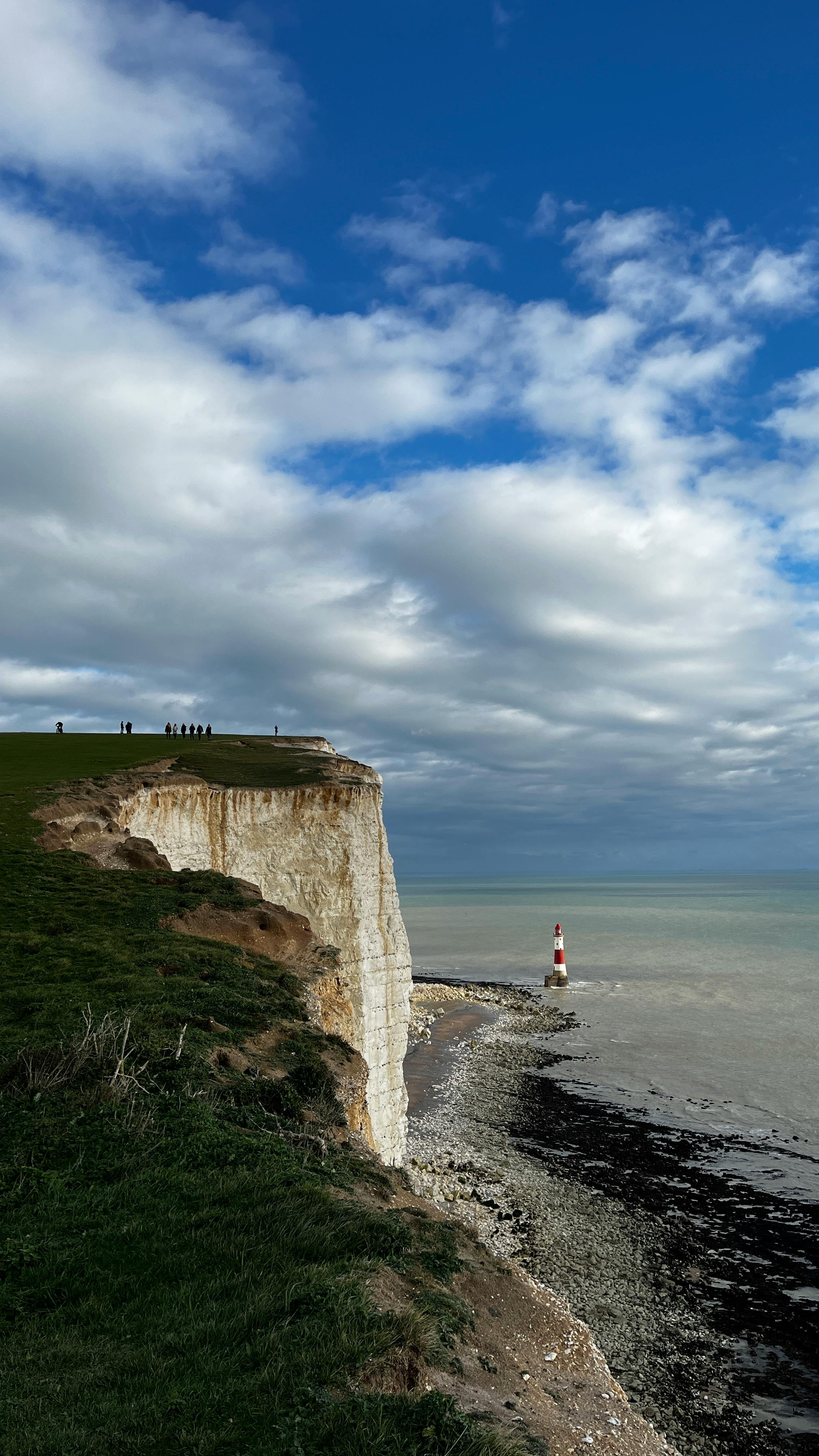Rock Cliff Beside the Ocean · Free Stock Photo