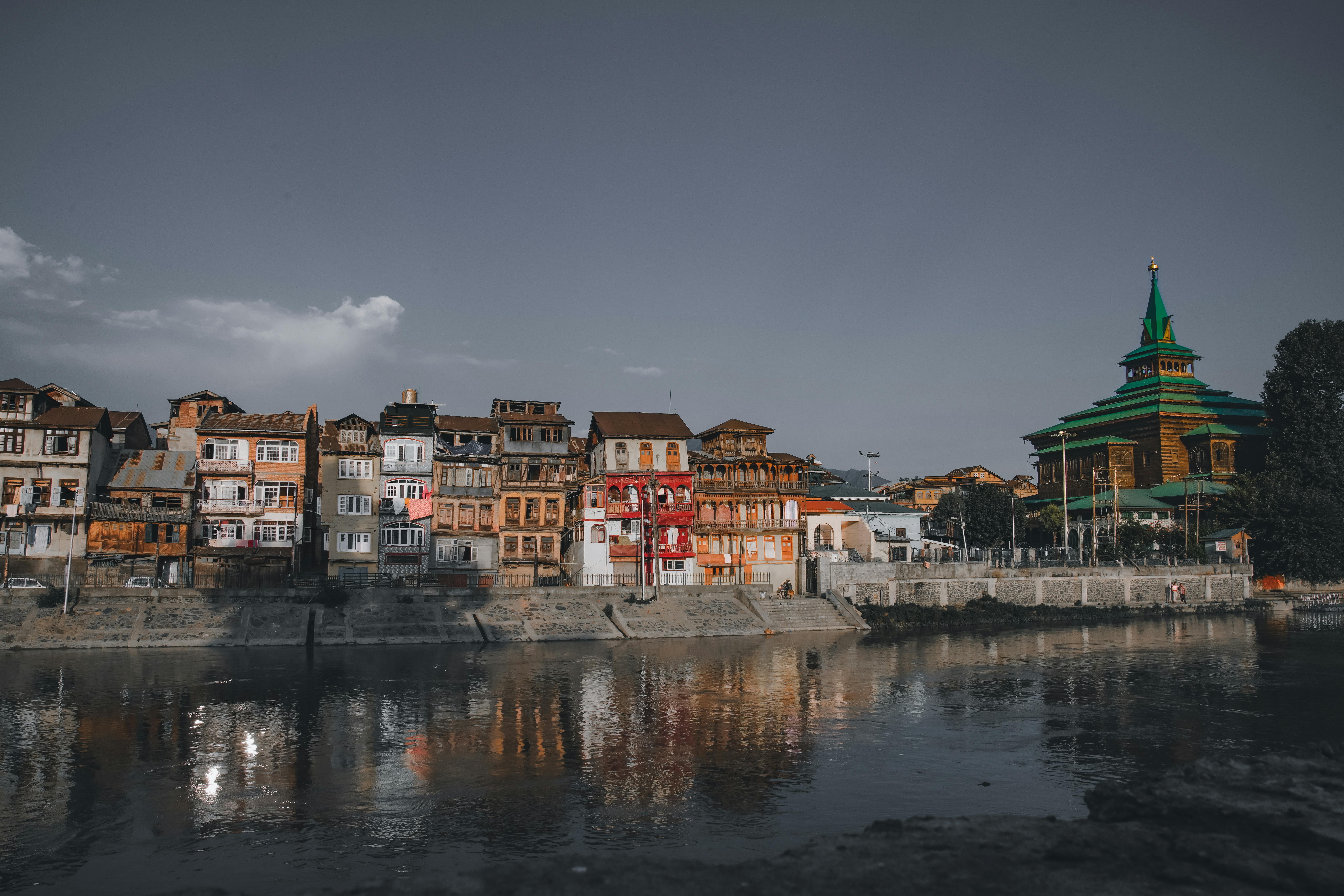 Old Building in front of a River · Free Stock Photo