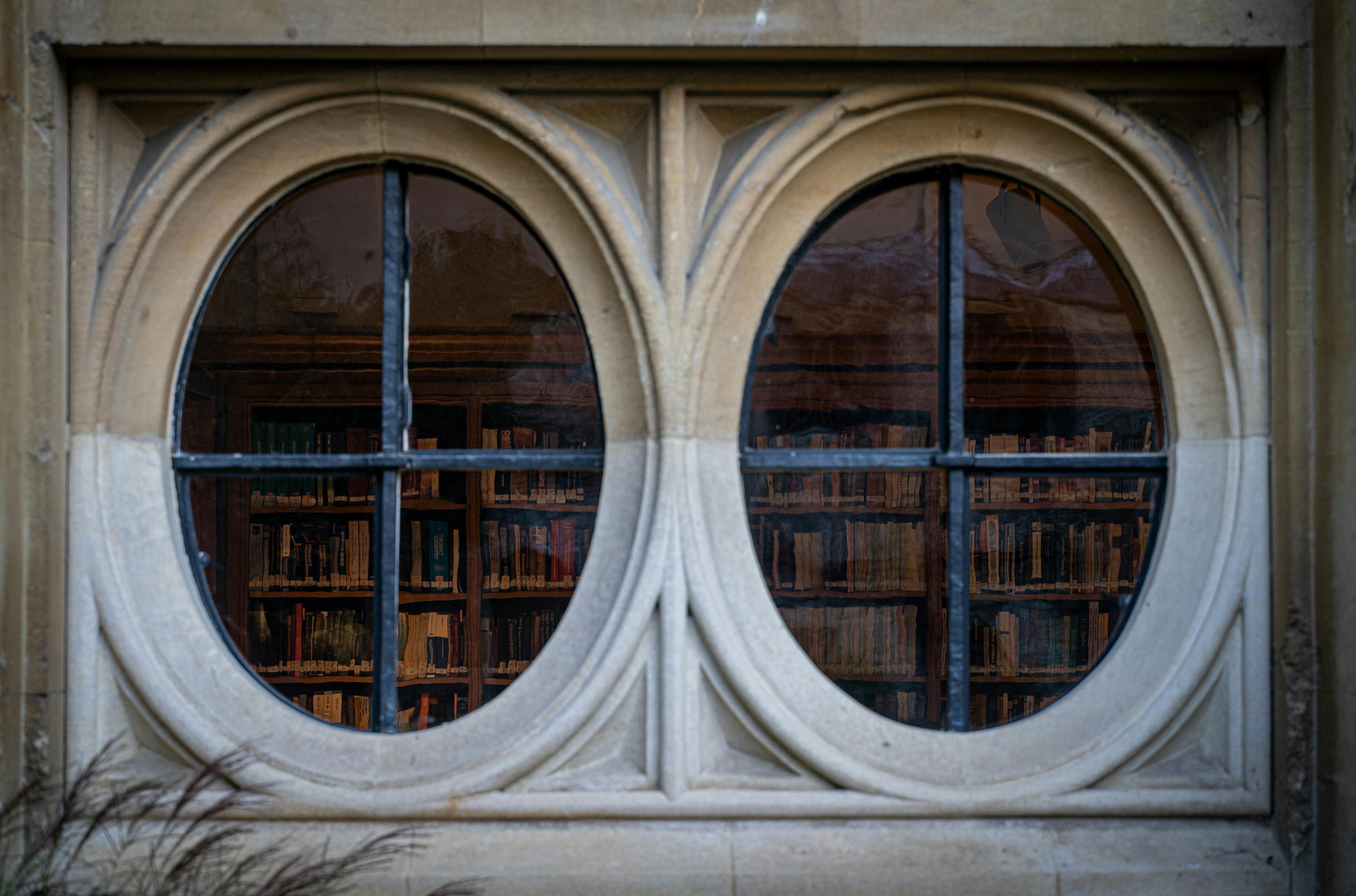 Round Windows of a Library · Free Stock Photo