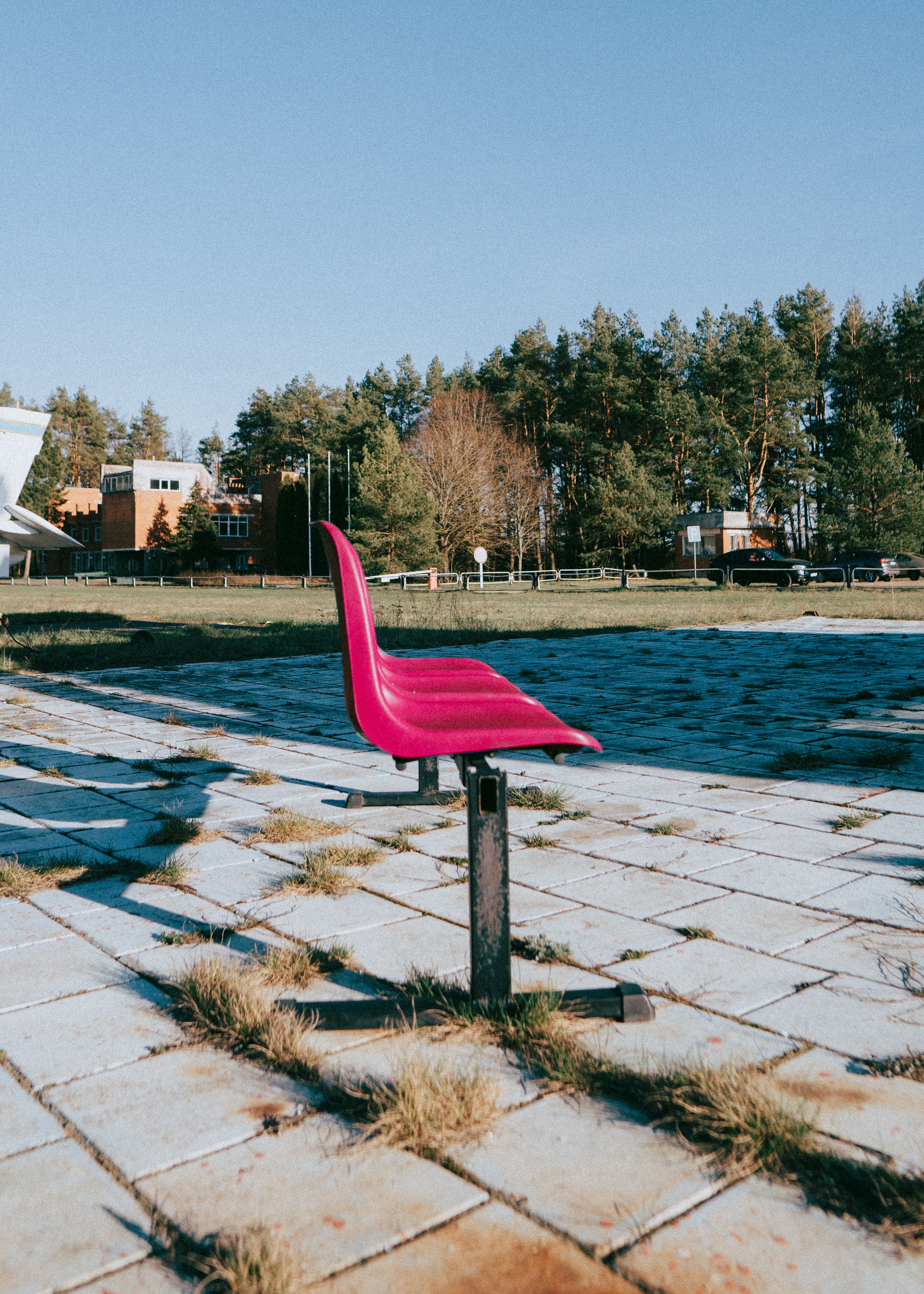 Bench on Pavement at Abandoned Airport · Free Stock Photo