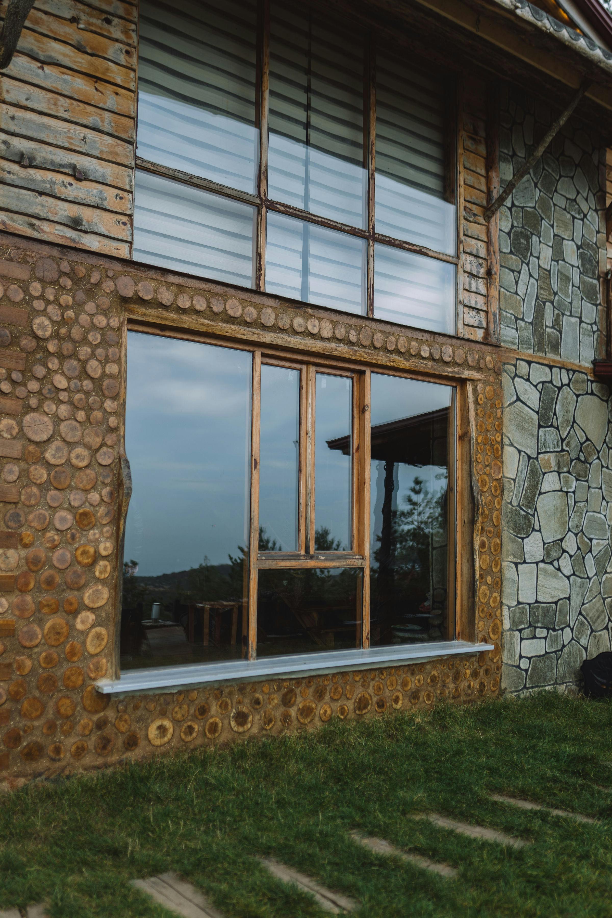 Grass near House Windows · Free Stock Photo