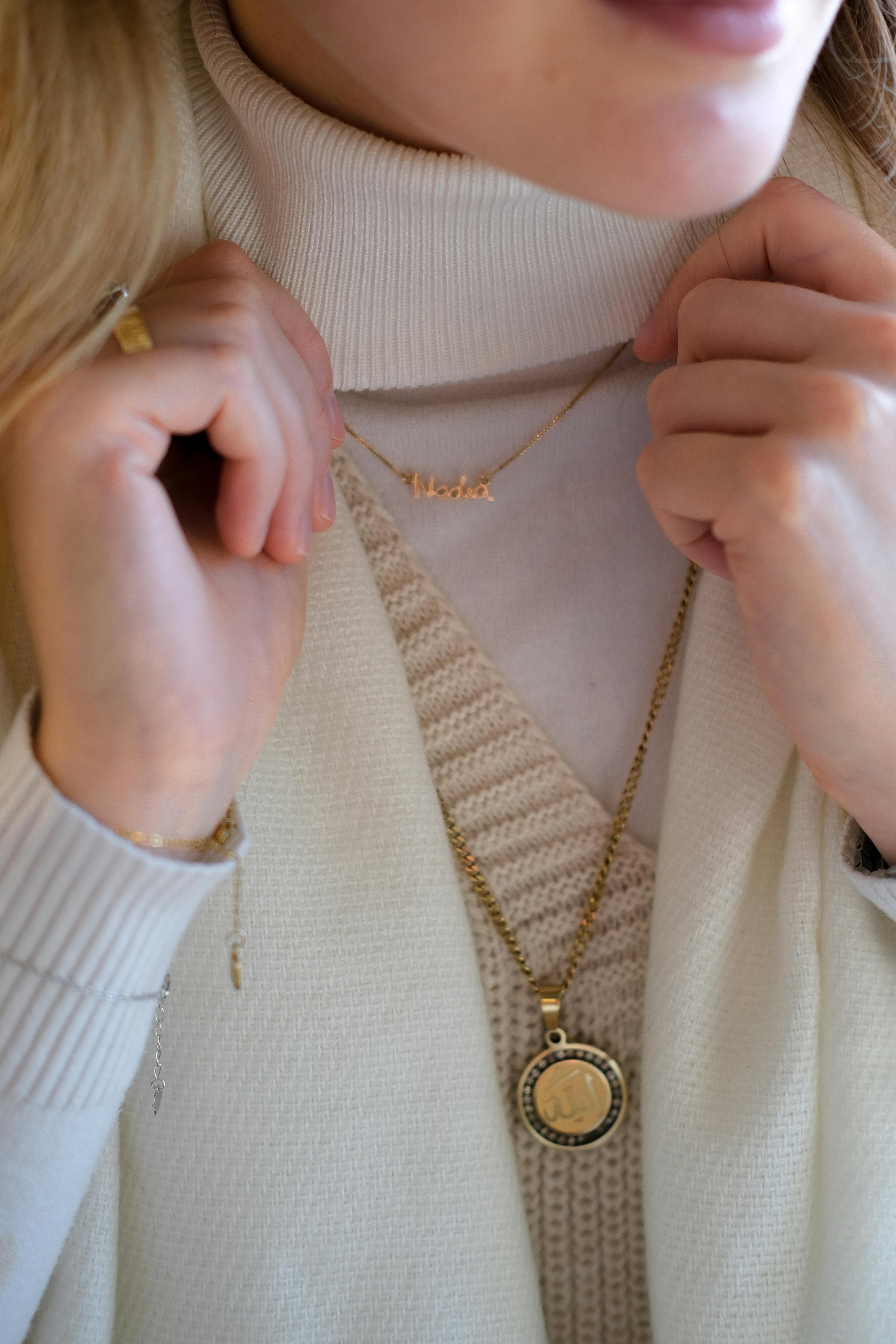 Woman Wearing Gold Pendant Necklace · Free Stock Photo