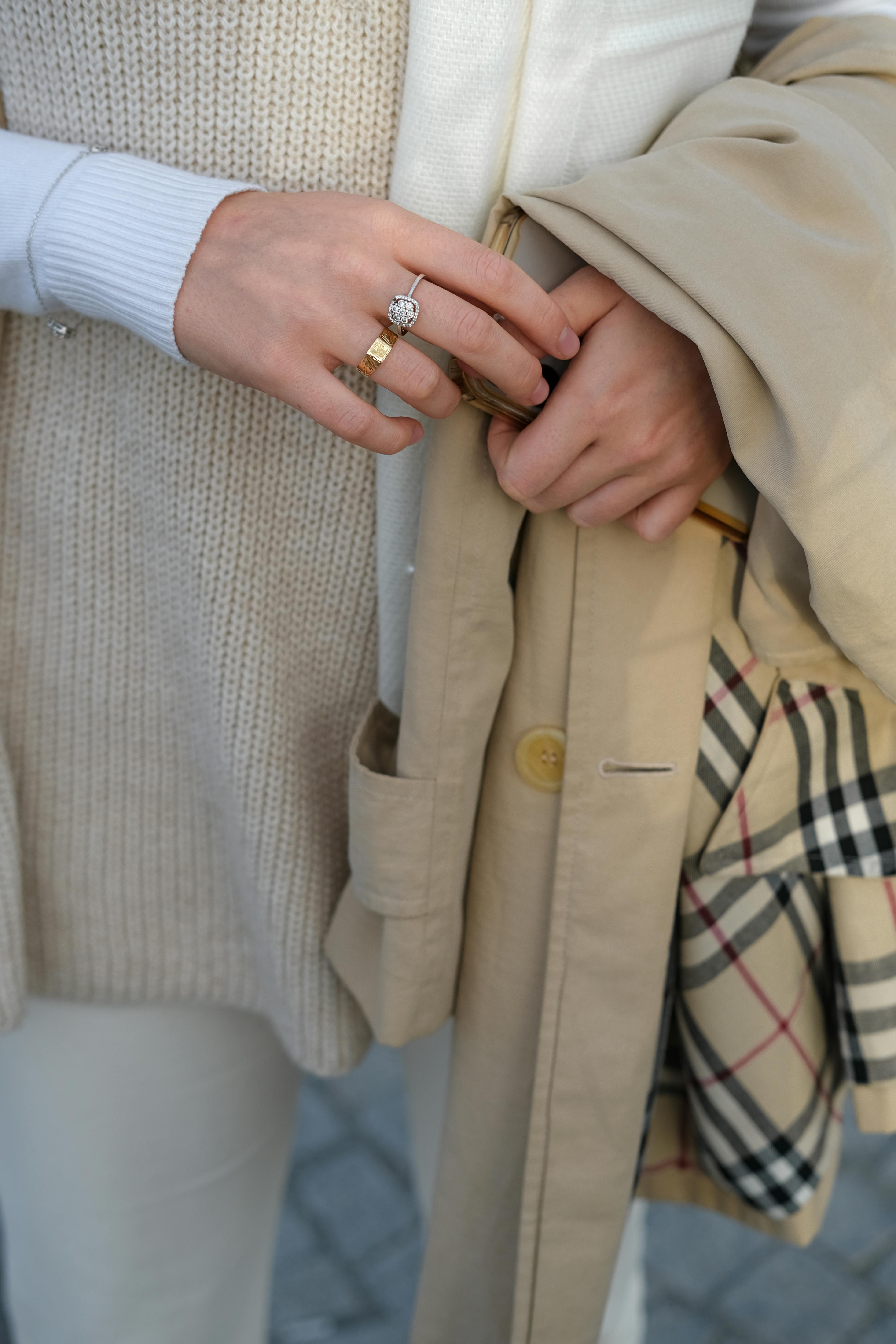 Person Coat Wearing Rings · Free Stock Photo