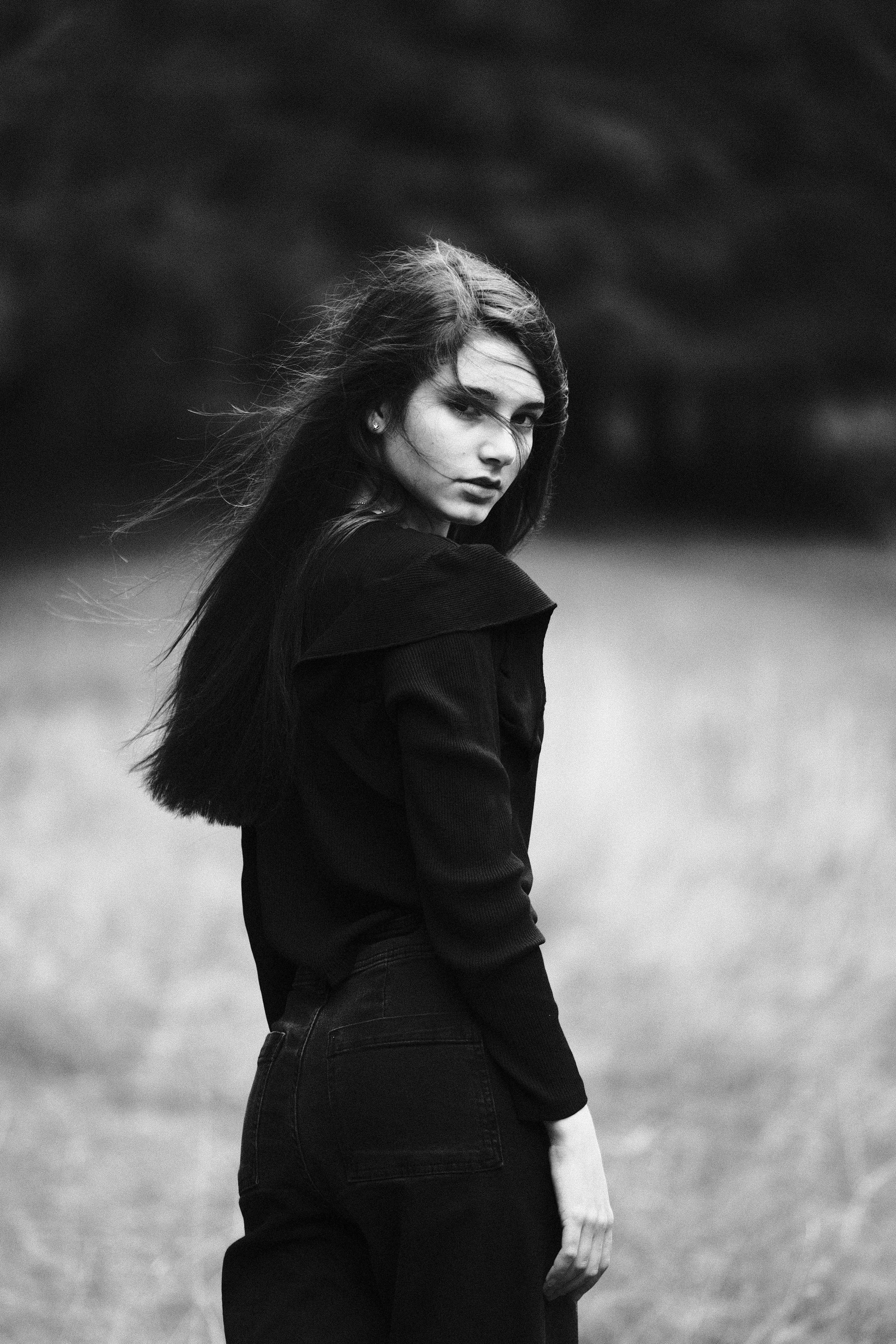 Portrait of a Woman Looking Over her Shoulder · Free Stock Photo