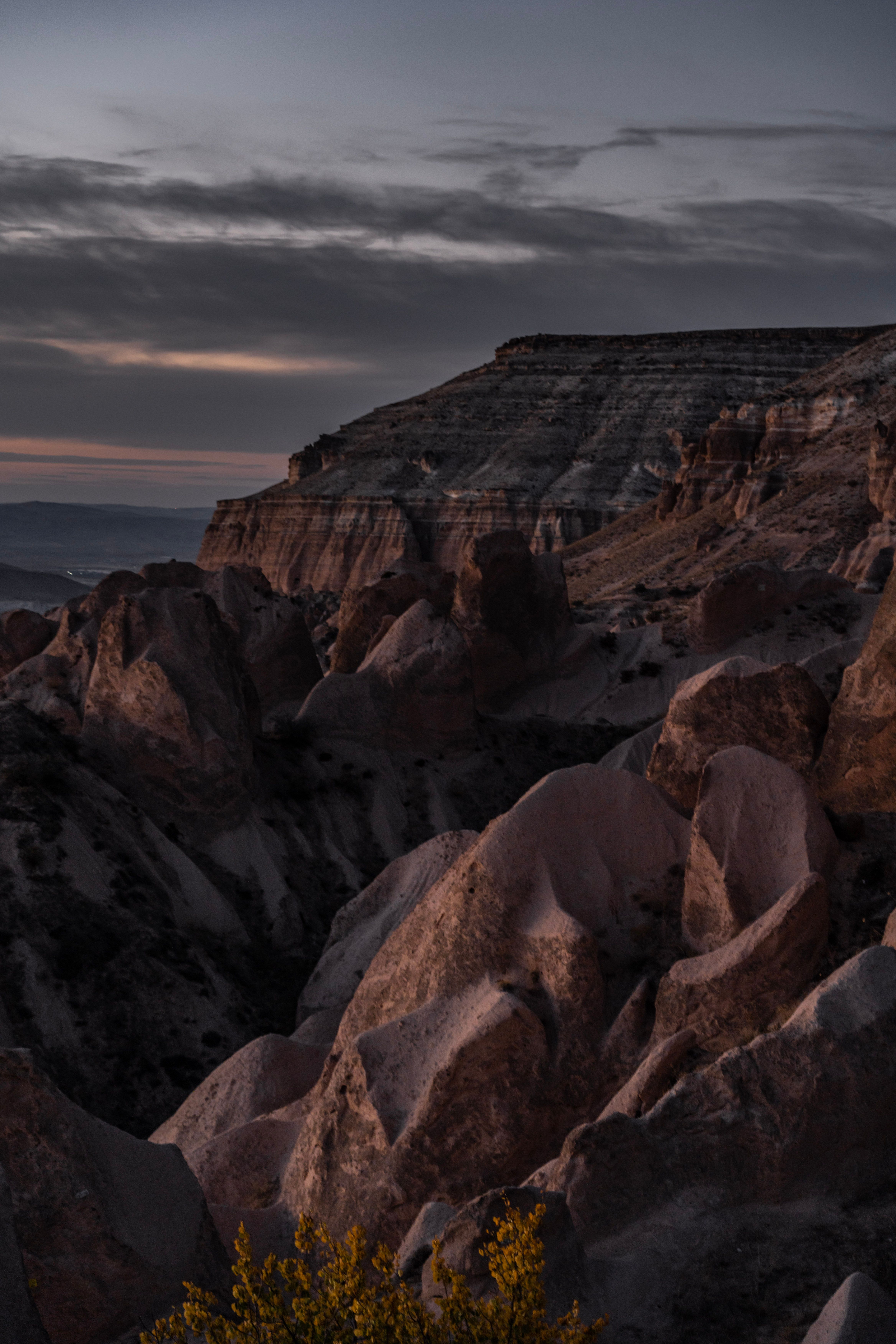 An Aerial Photography of a Rock Formations Under the Dark Sky · Free ...