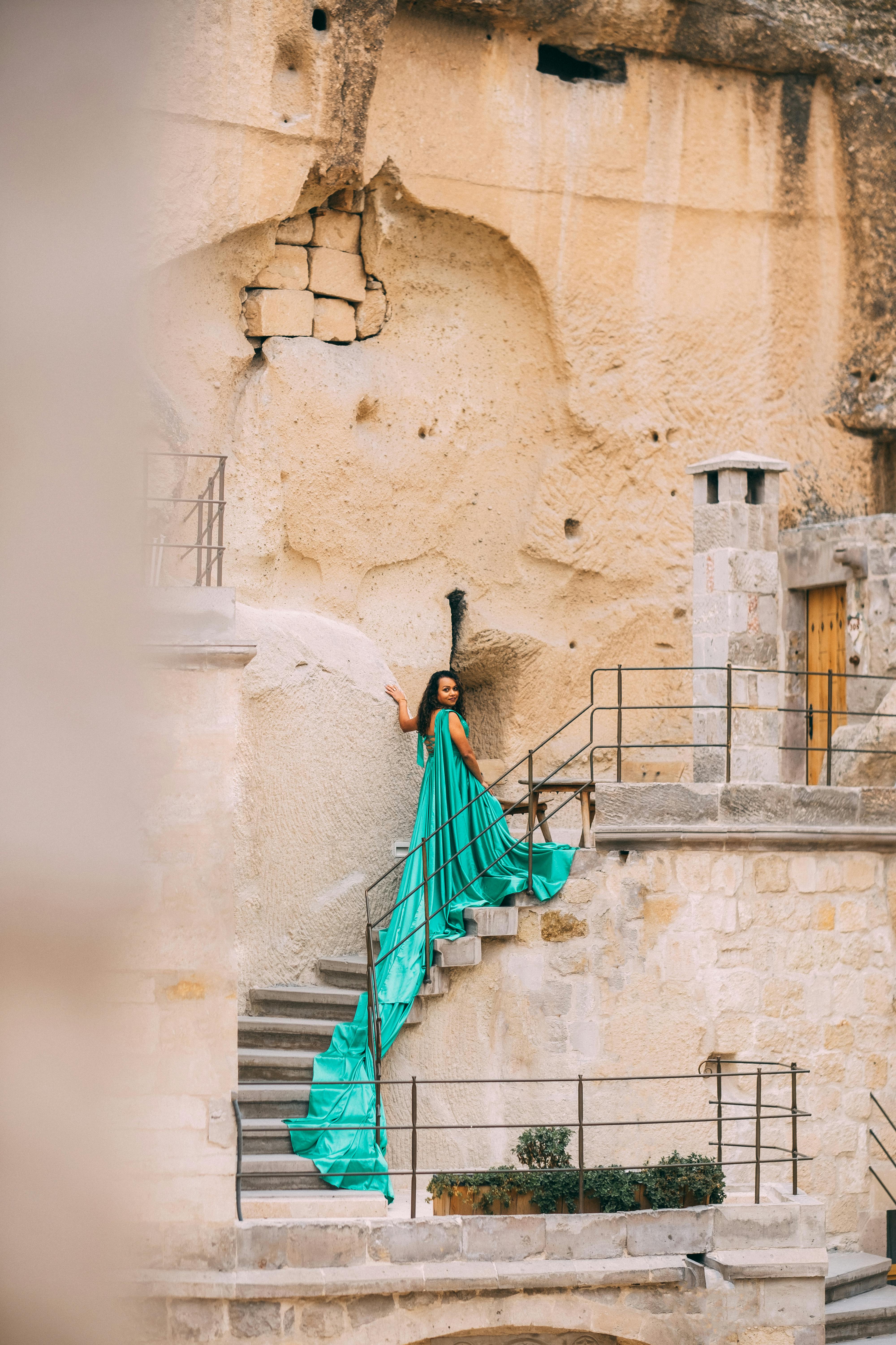 Woman in Dress on Stairs · Free Stock Photo