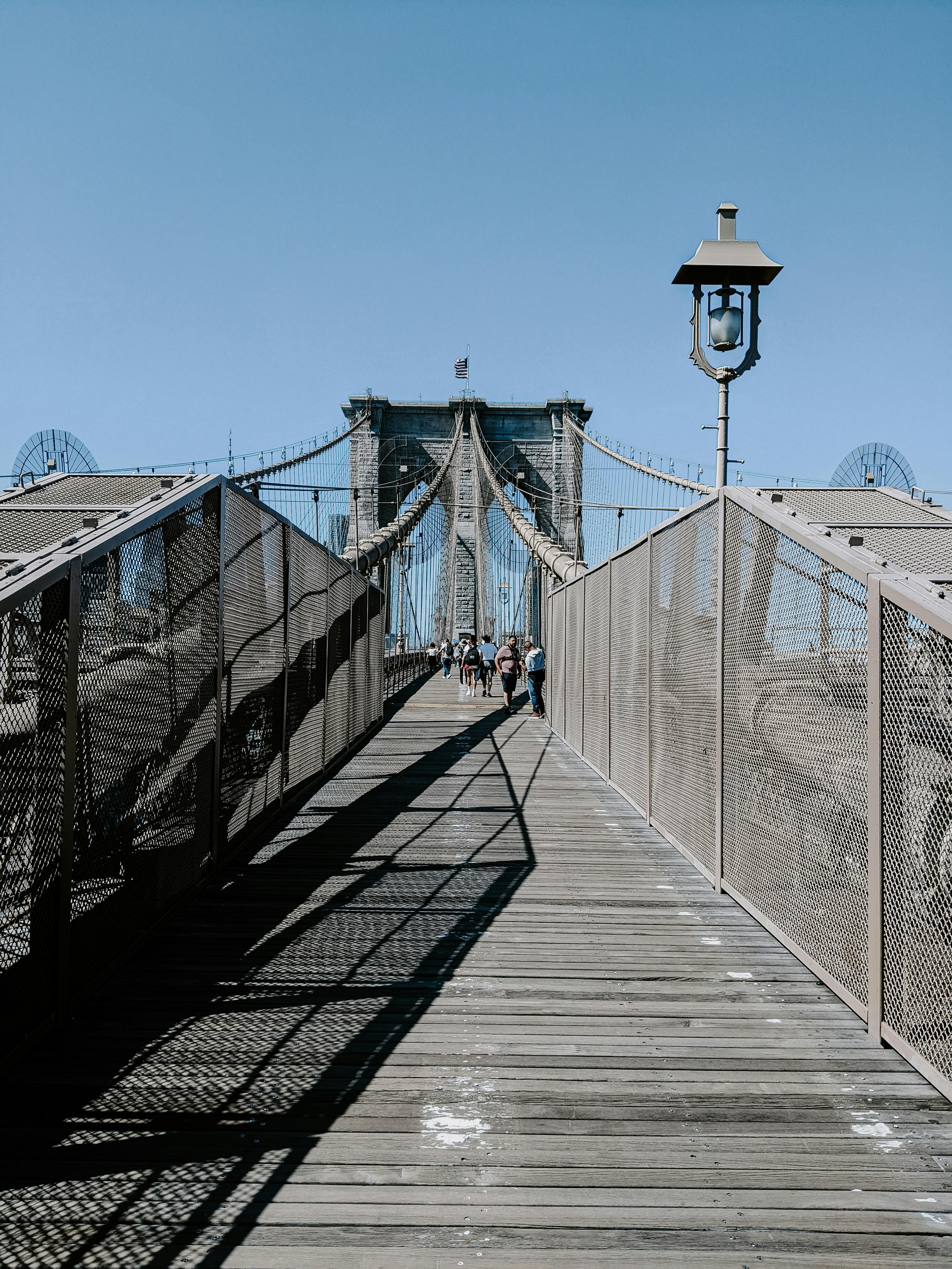 american flag on top of bridge · Free Stock Photo