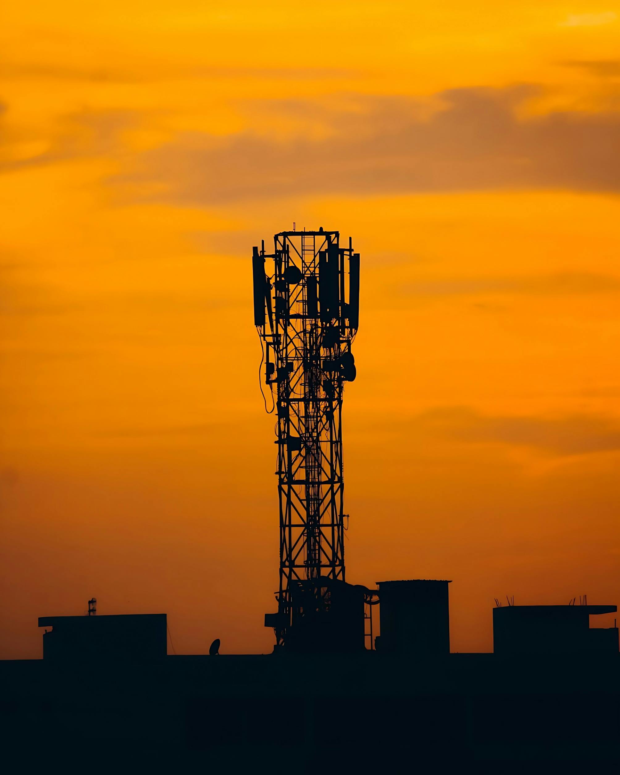 Silhouette of a Telecommunication Tower during Sunset · Free Stock Photo