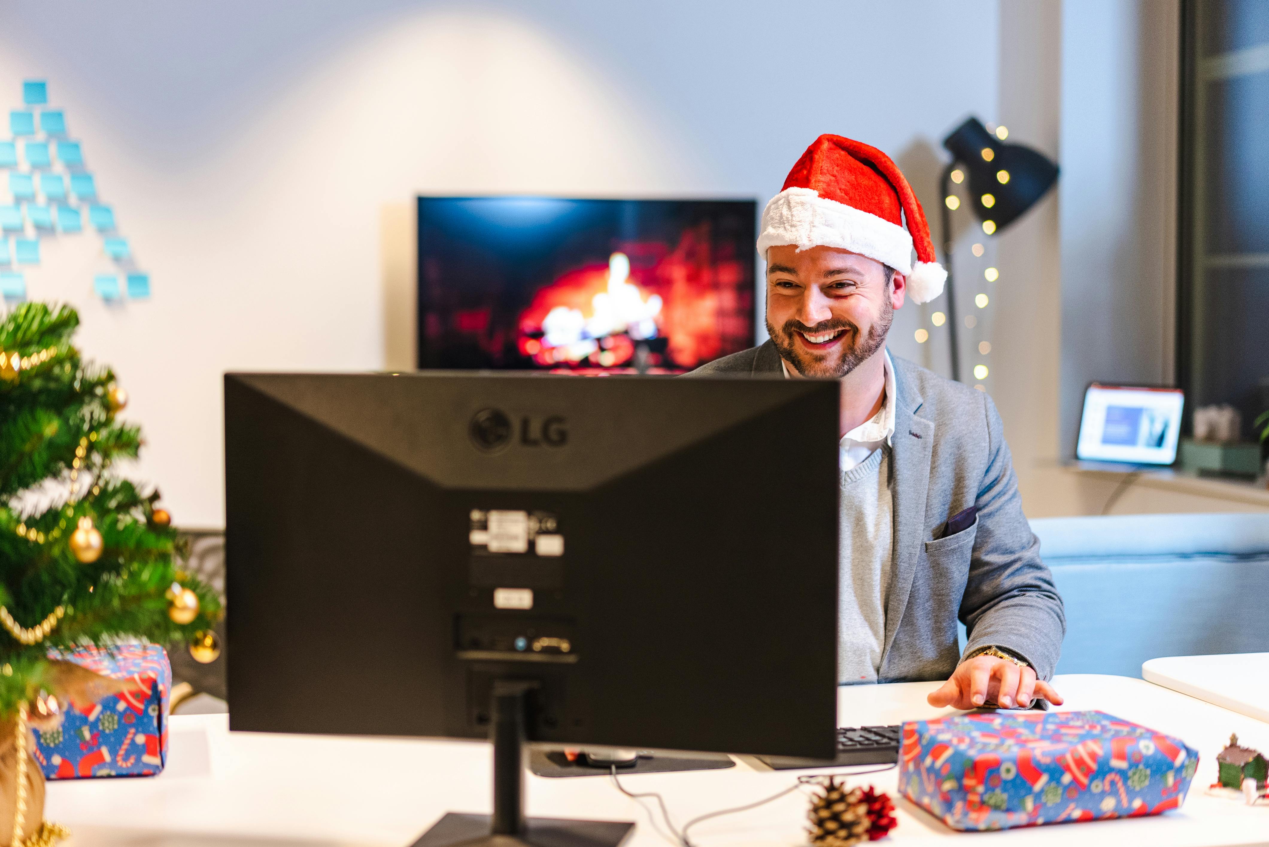 People in the Office Holding Christmas Gifs · Free Stock Photo