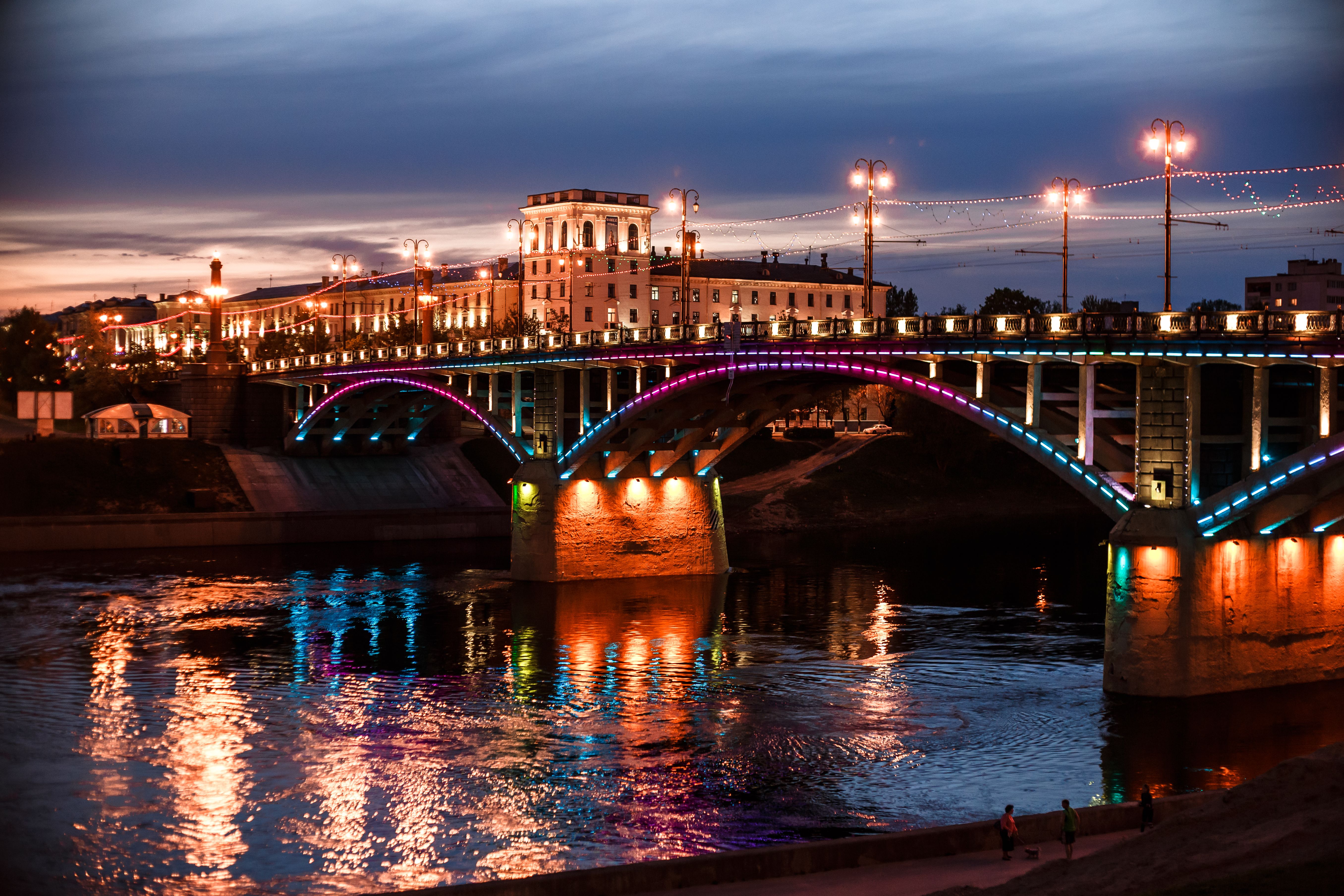 Illuminated Bridge in City in Evening · Free Stock Photo