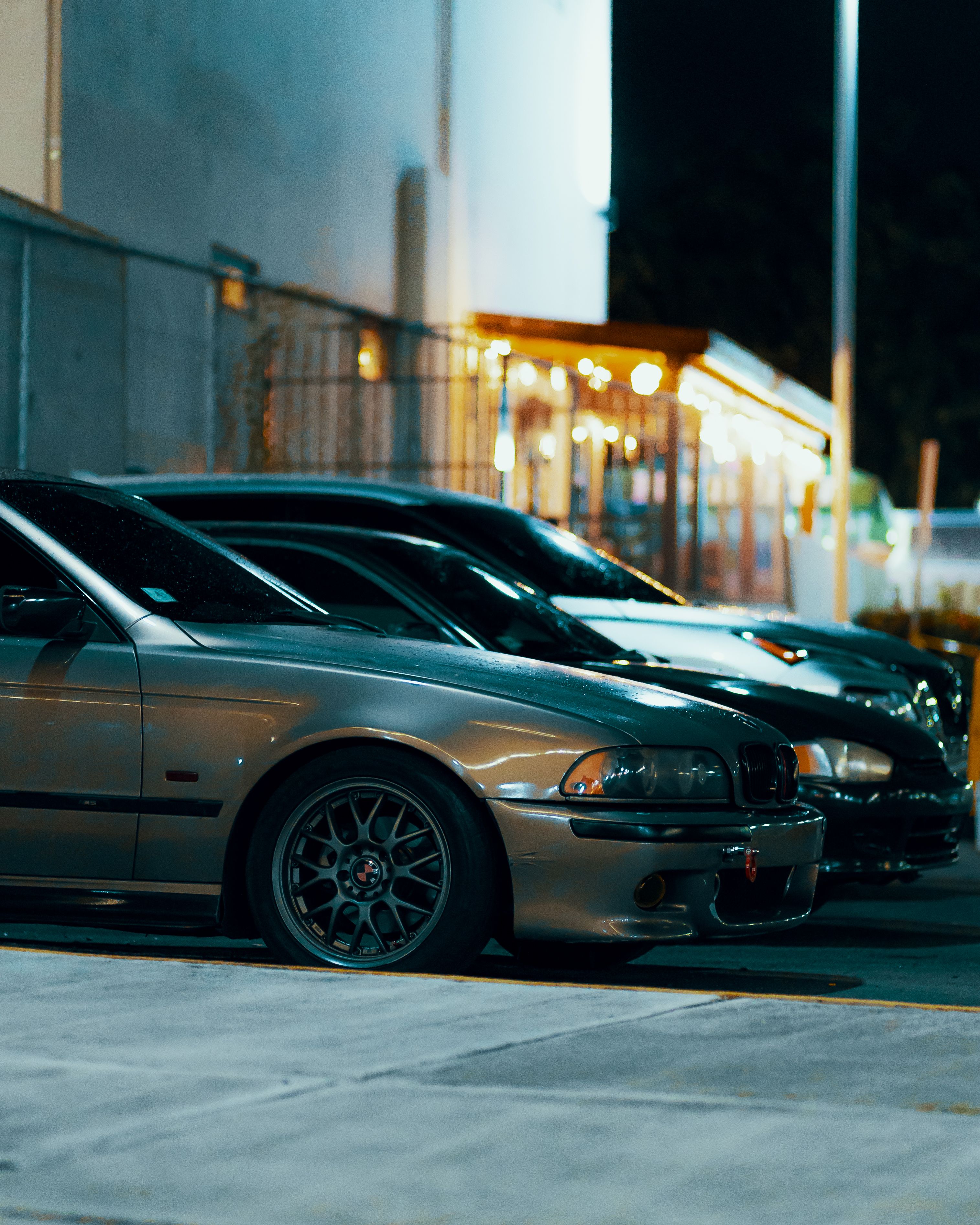 Cars Parked on Concrete Pavement During Night Time · Free Stock Photo