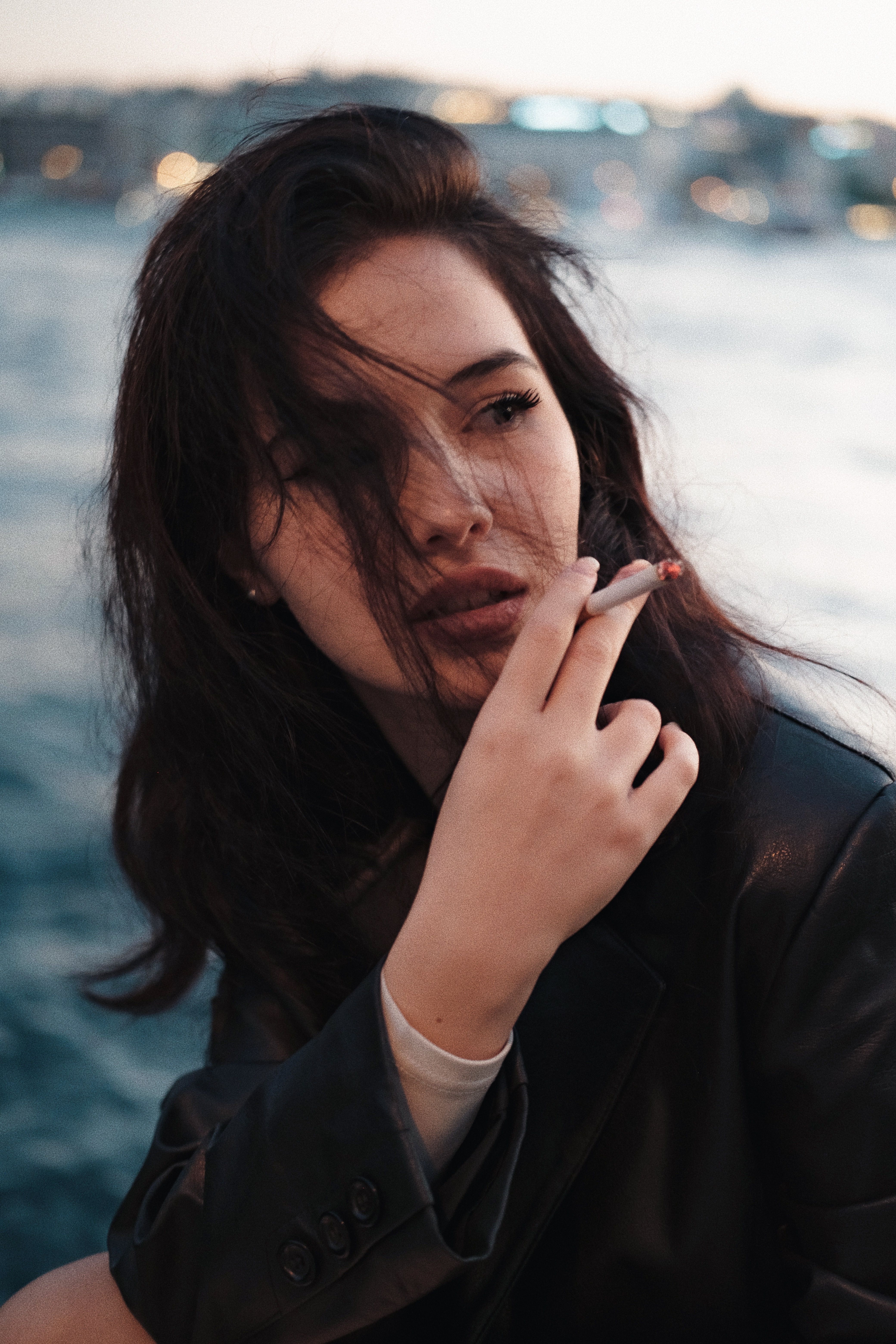 Close-up of Woman Smoking a Cigarette · Free Stock Photo