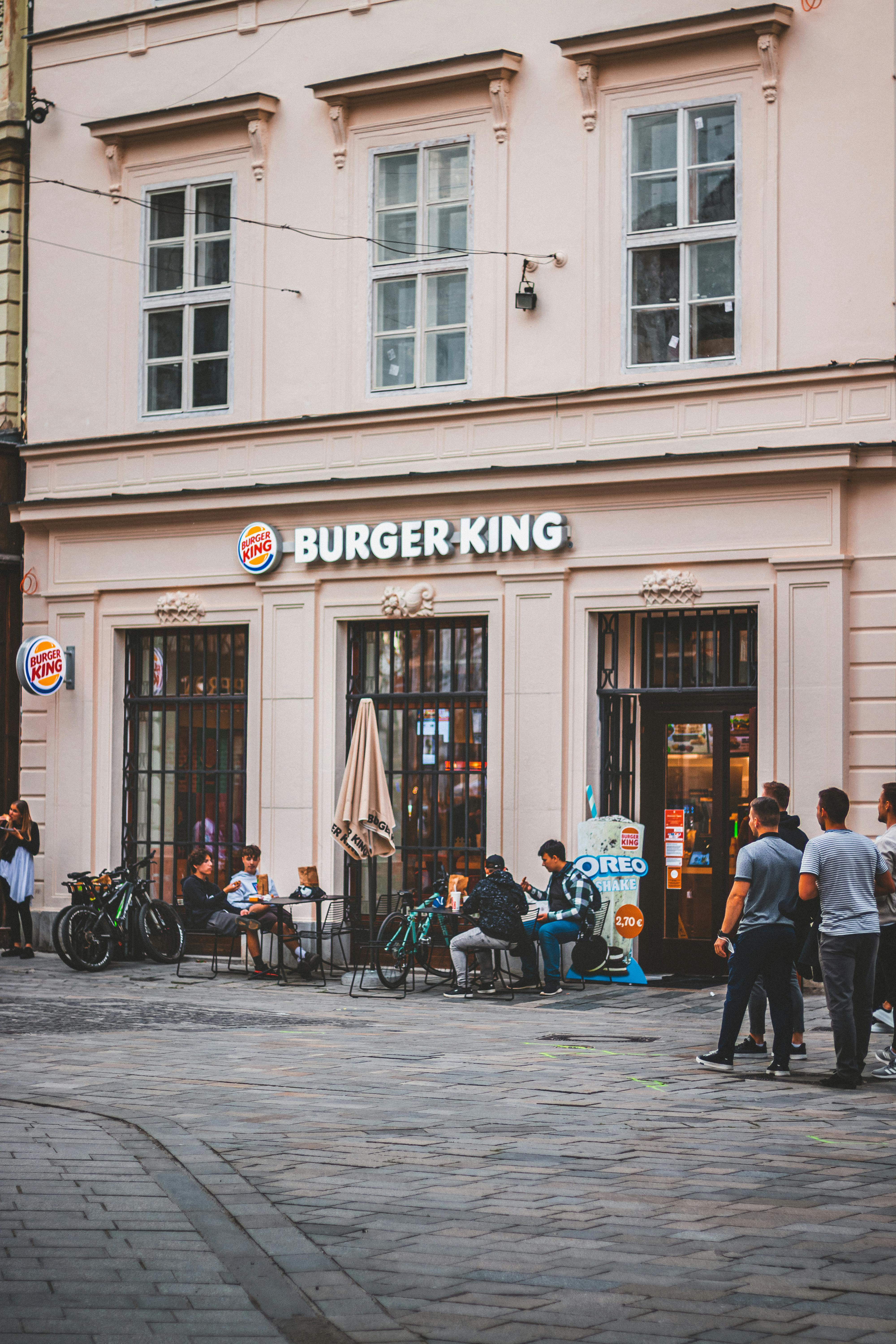 People Walking near Burger King · Free Stock Photo