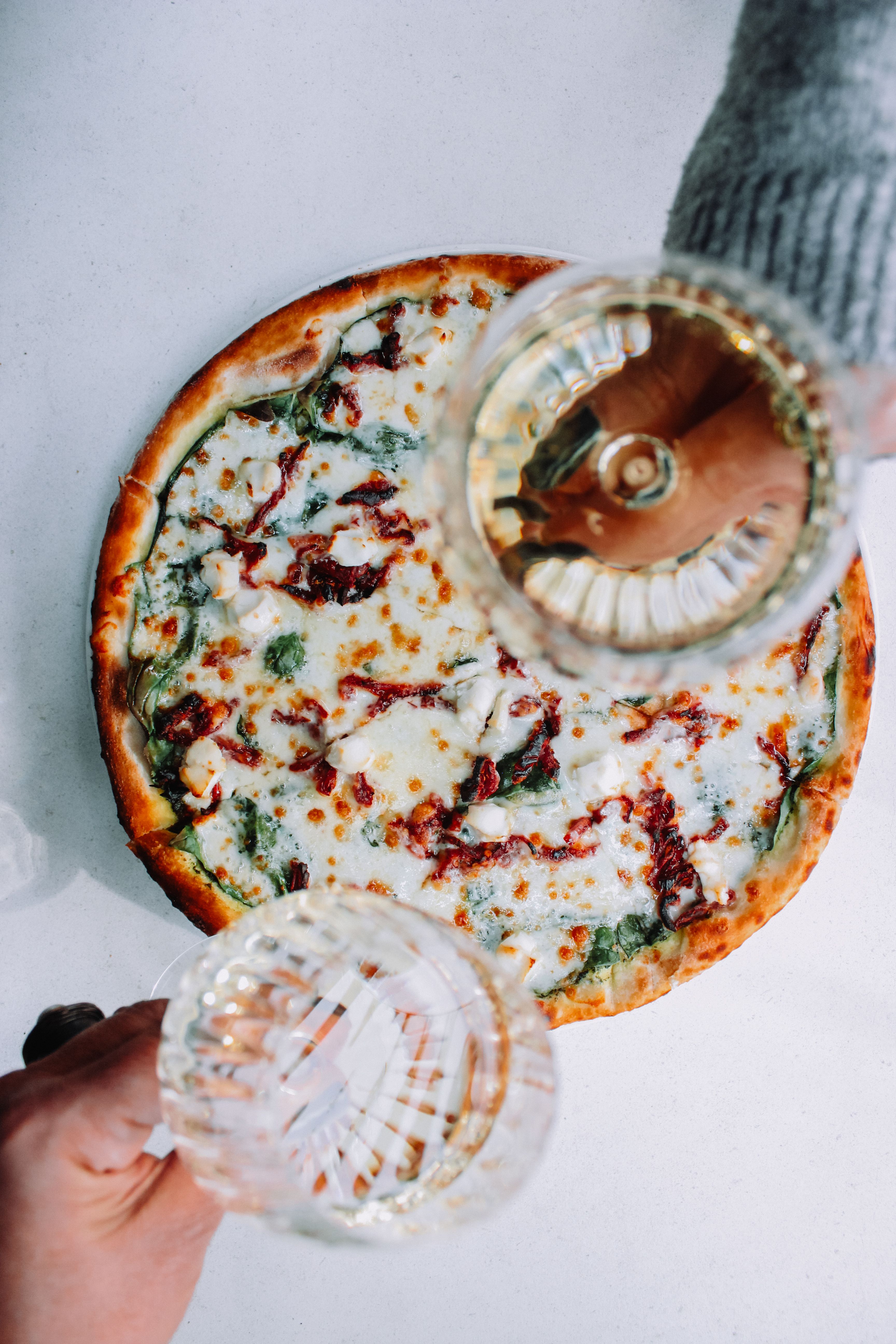 Glasses over Pizza · Free Stock Photo