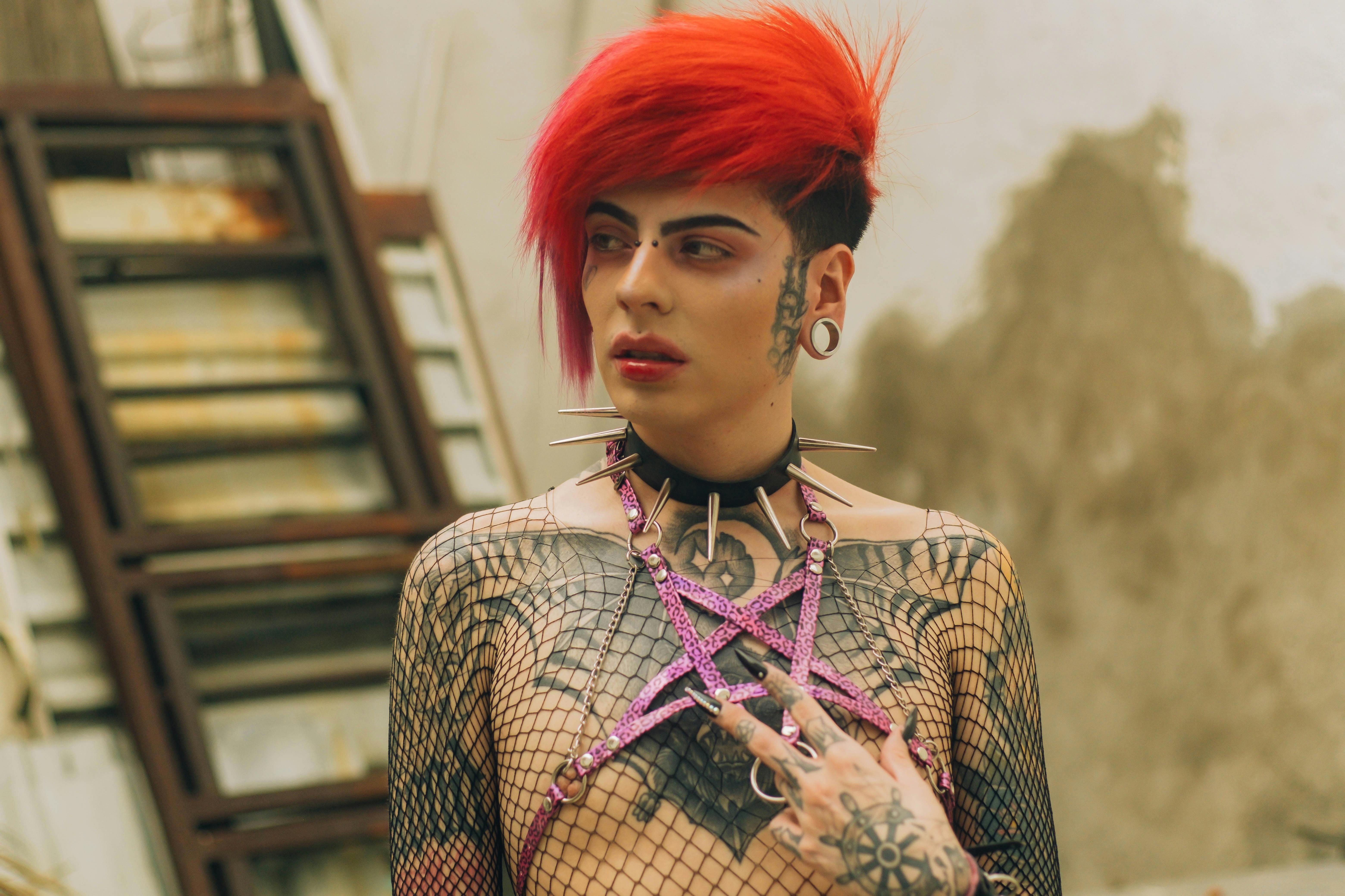 Fashion portrait photo of a Cross dressed guy, wearing drag makeup with ...