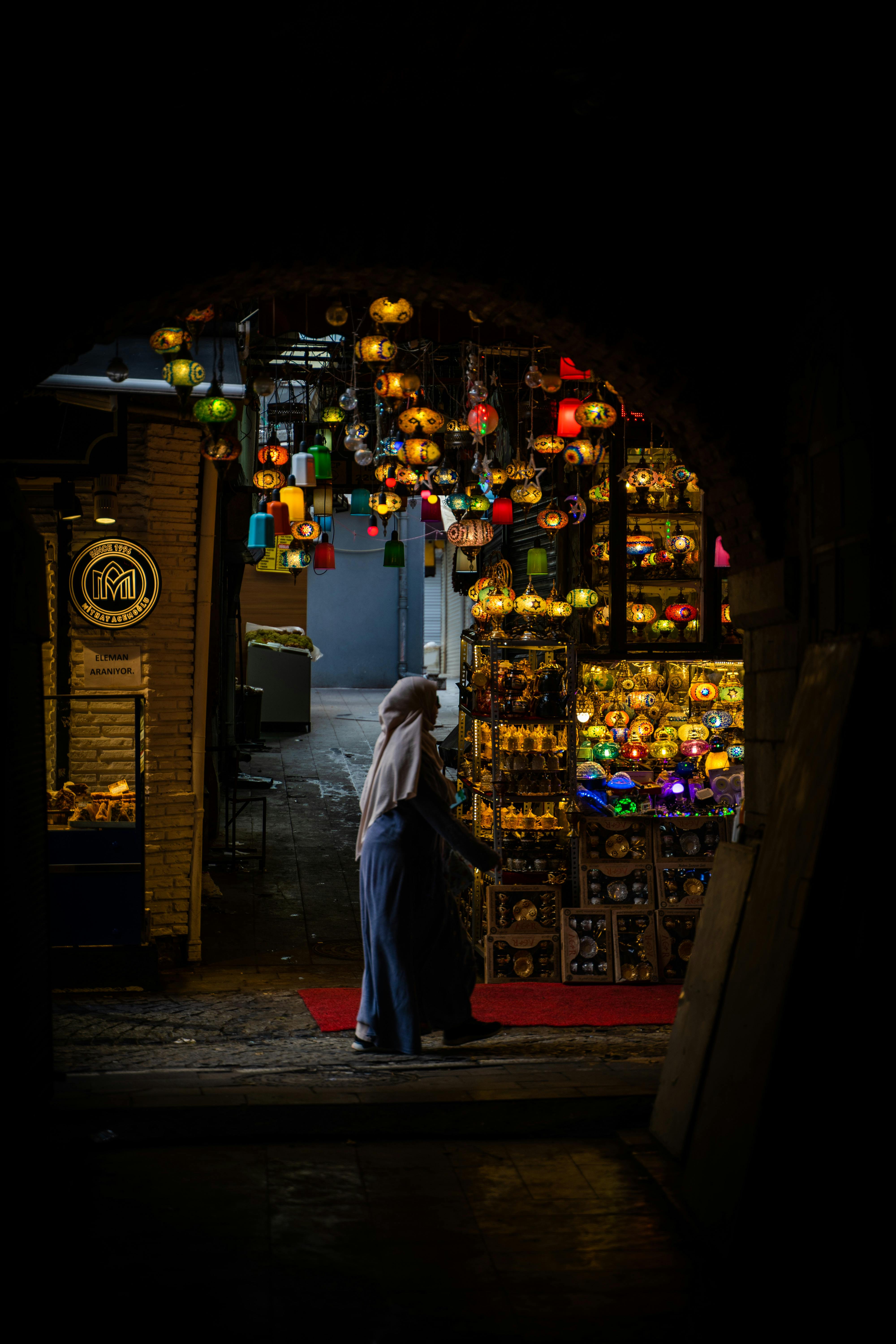 Woman in Hijab at Bazaar at Night · Free Stock Photo