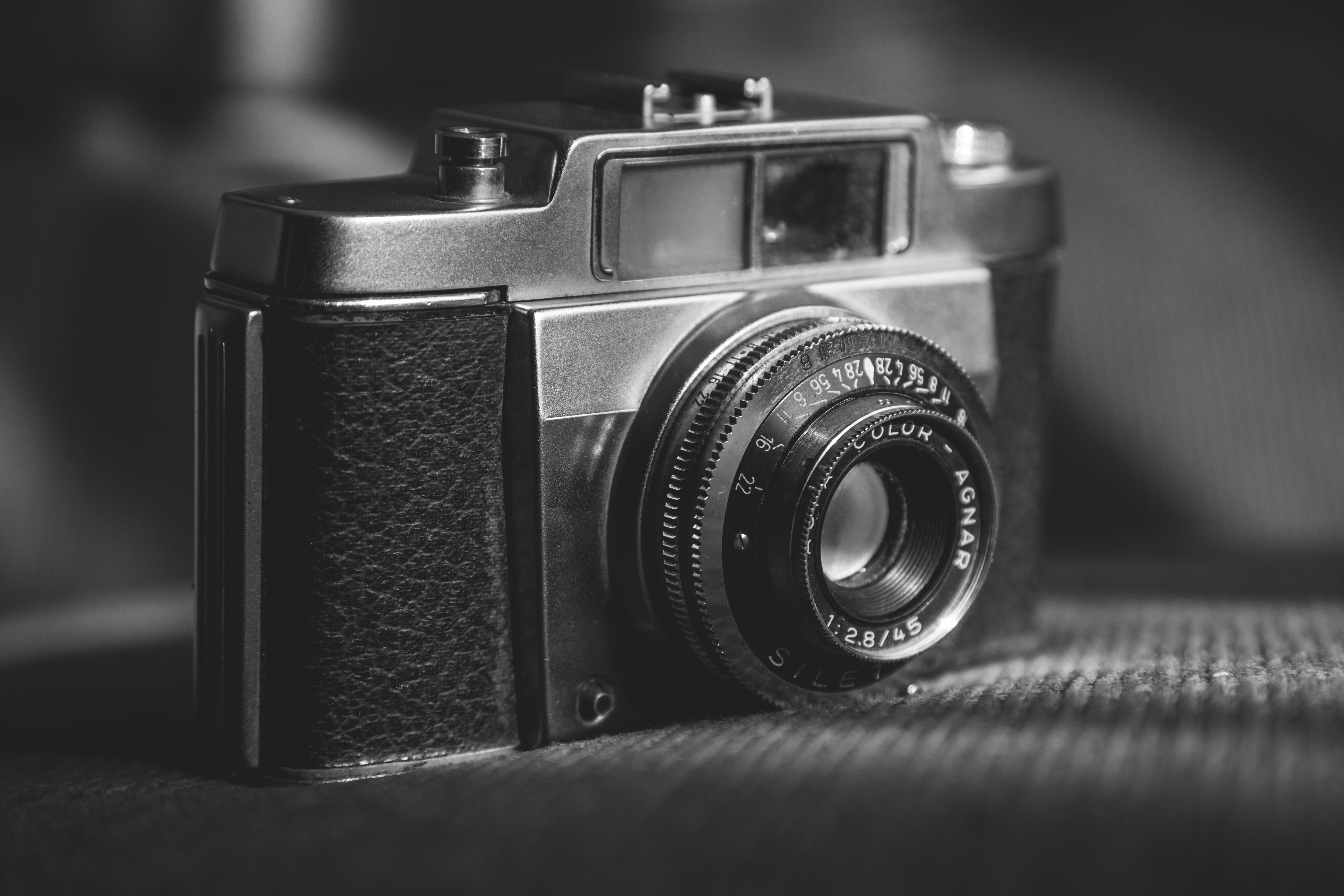 Grayscale Photo of a Camera · Free Stock Photo