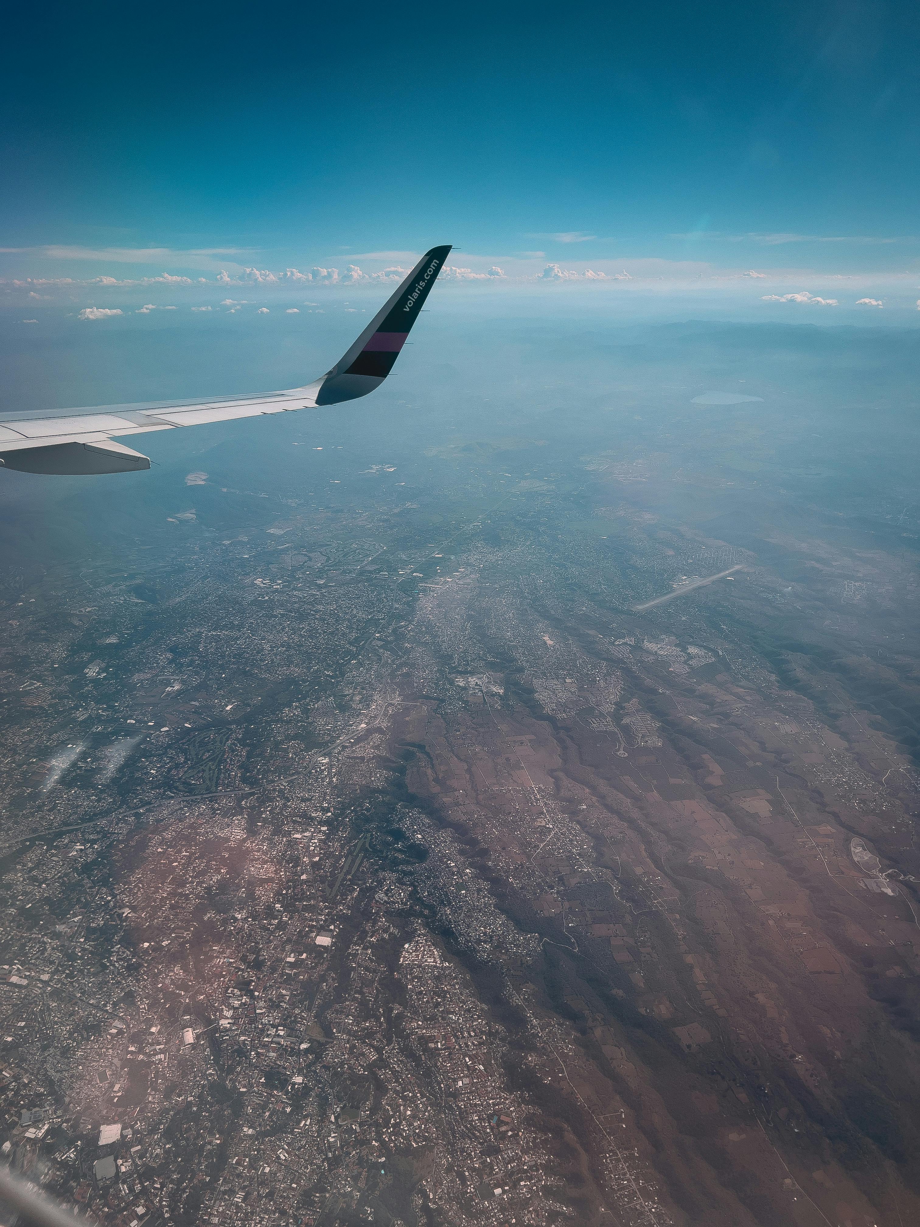 Plane Wing above Land · Free Stock Photo