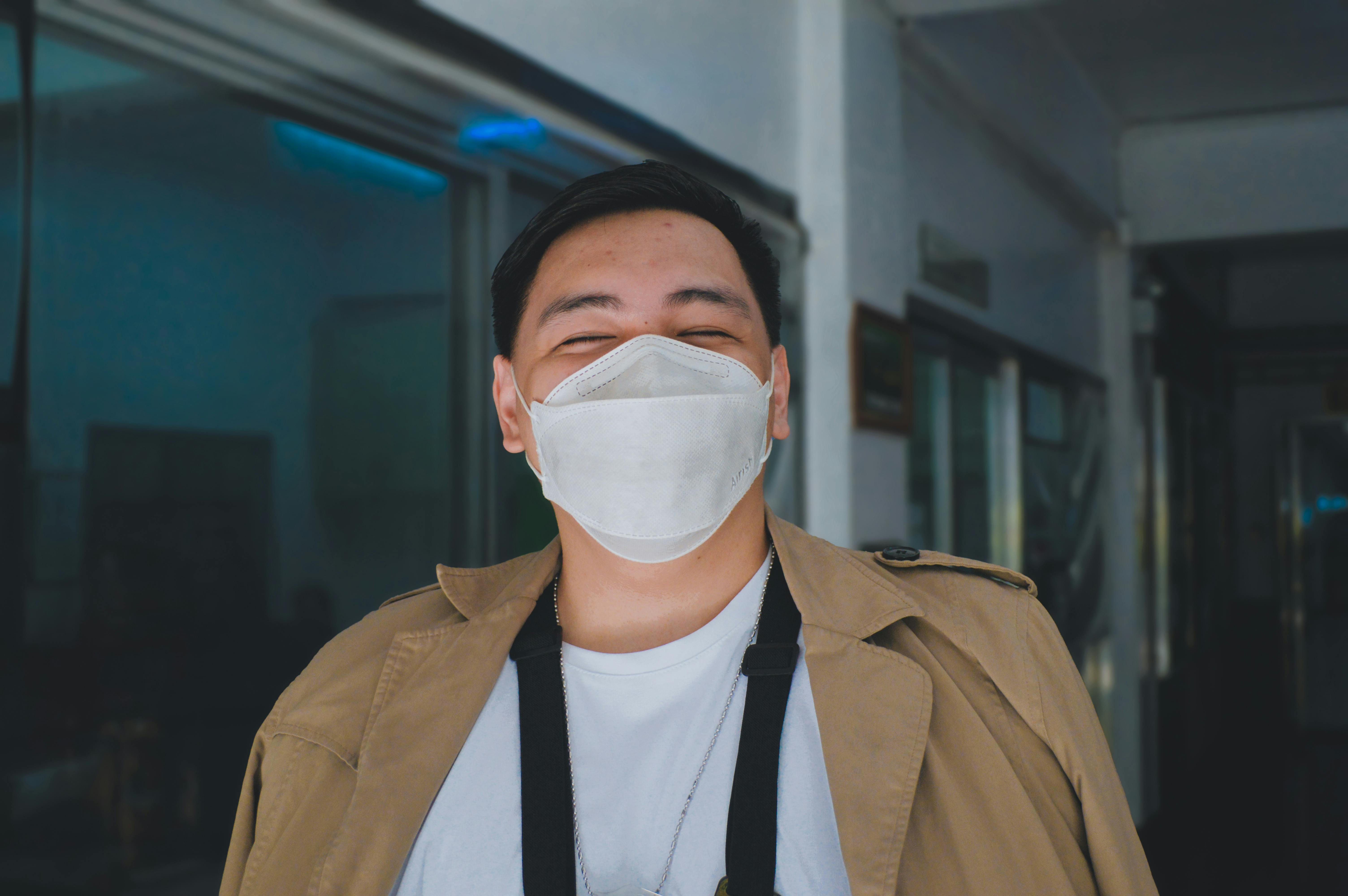A Group of People Sitting on Bleachers · Free Stock Photo