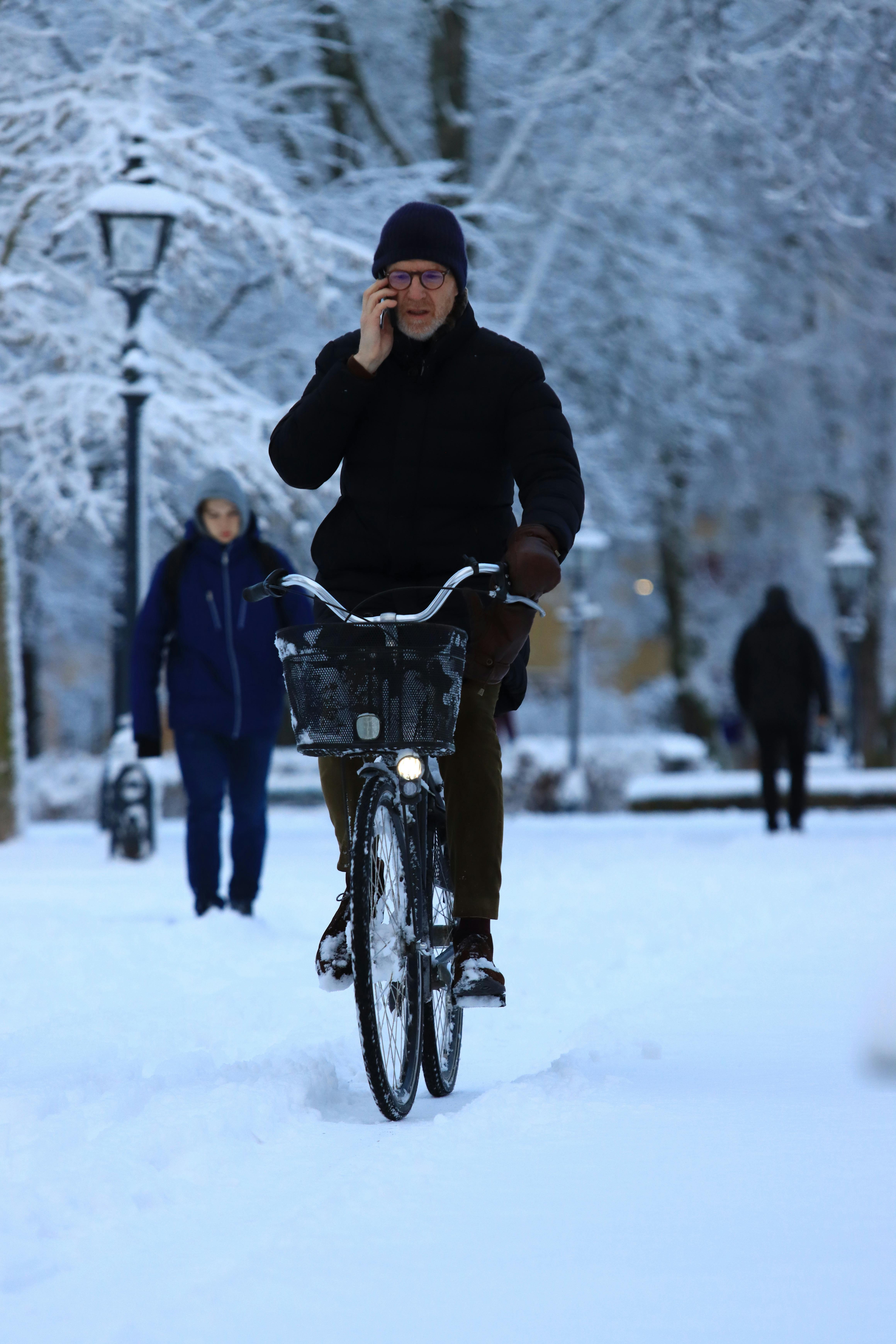 Man Riding on Bike on Snow · Free Stock Photo