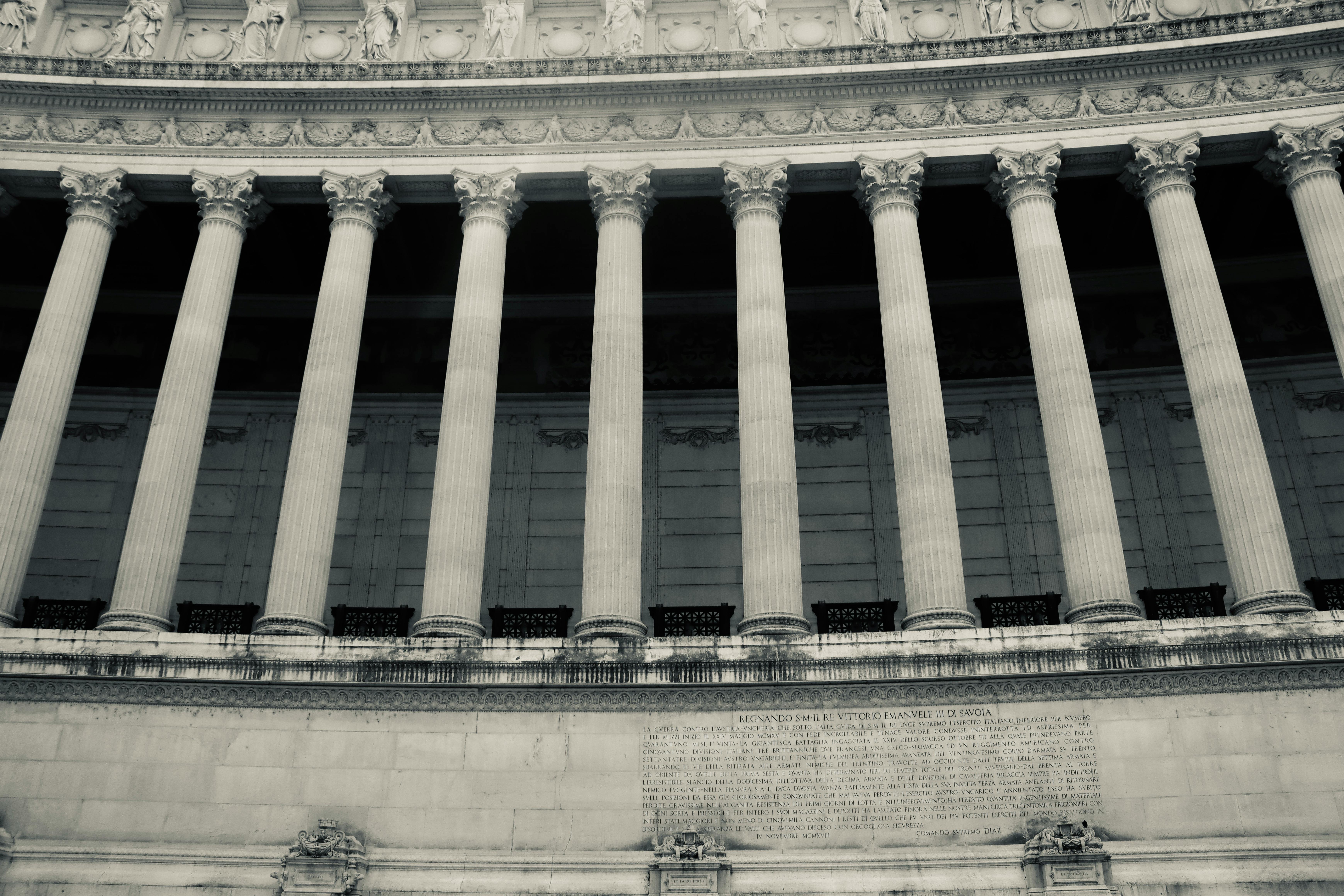 Low Angle Shot of a Building with Columns · Free Stock Photo